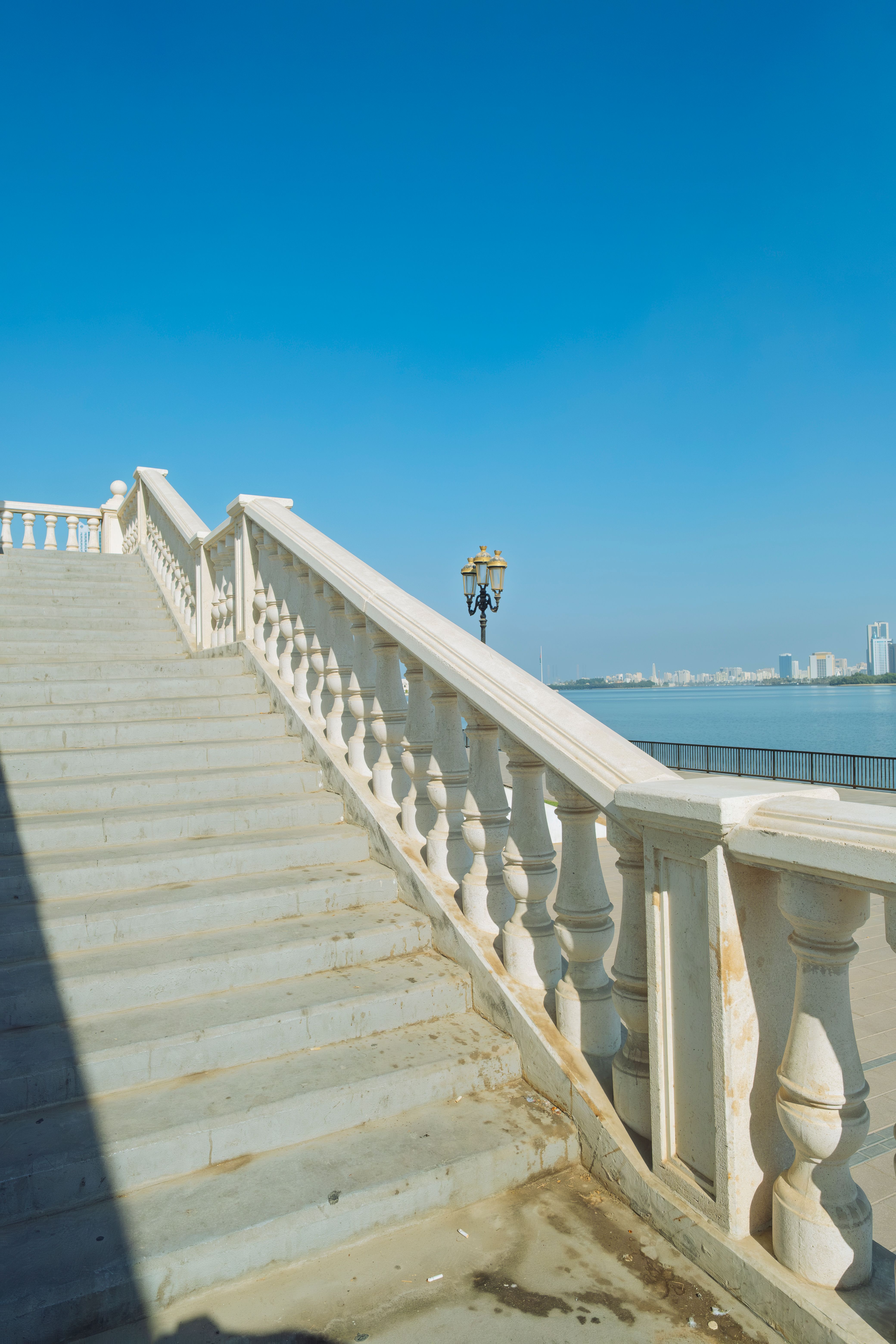 Elegant Marble Staircase by Waterfront in Sharjah · Free Stock Photo