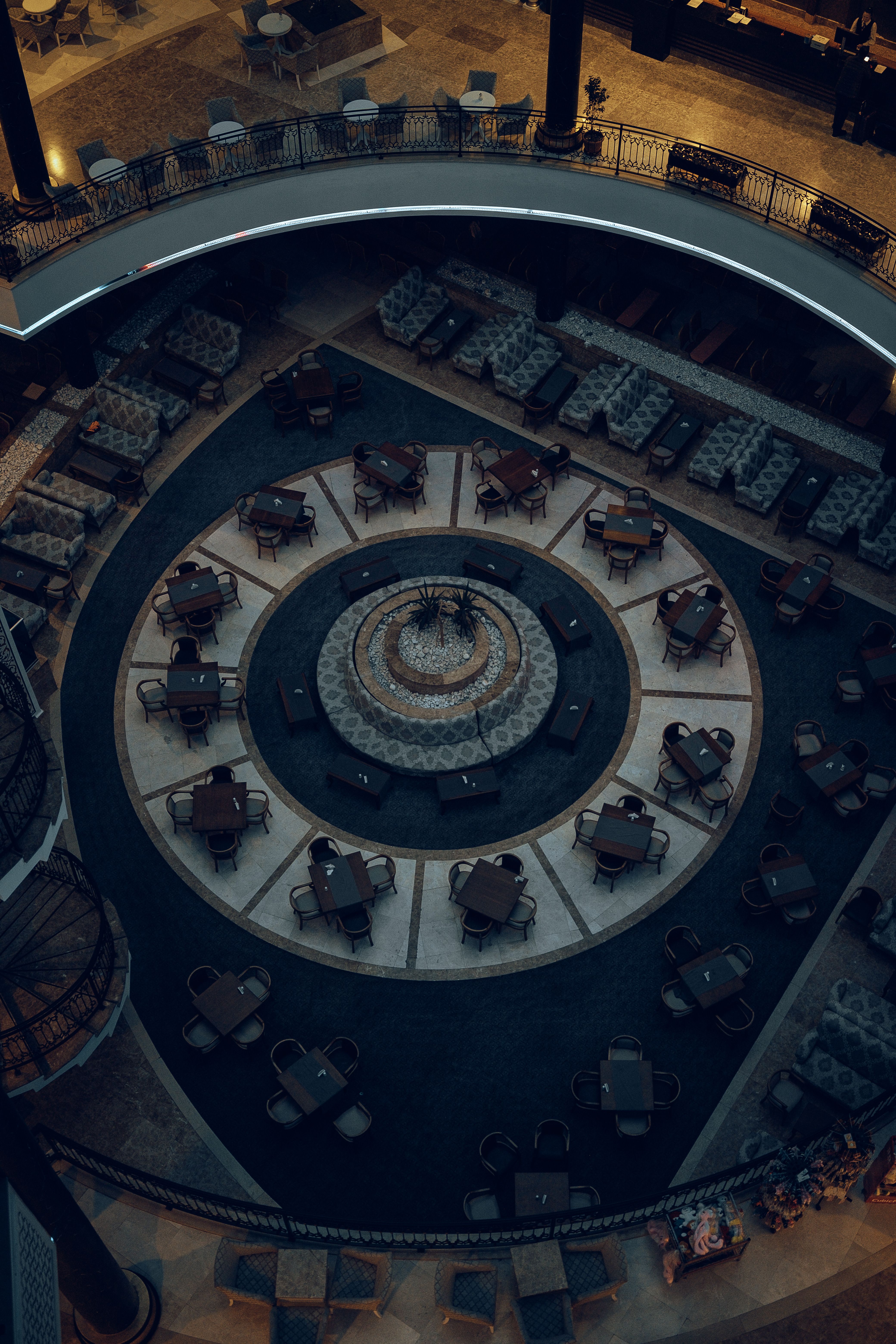 Aerial View of Modern Circular Indoor Dining Area · Free Stock Photo