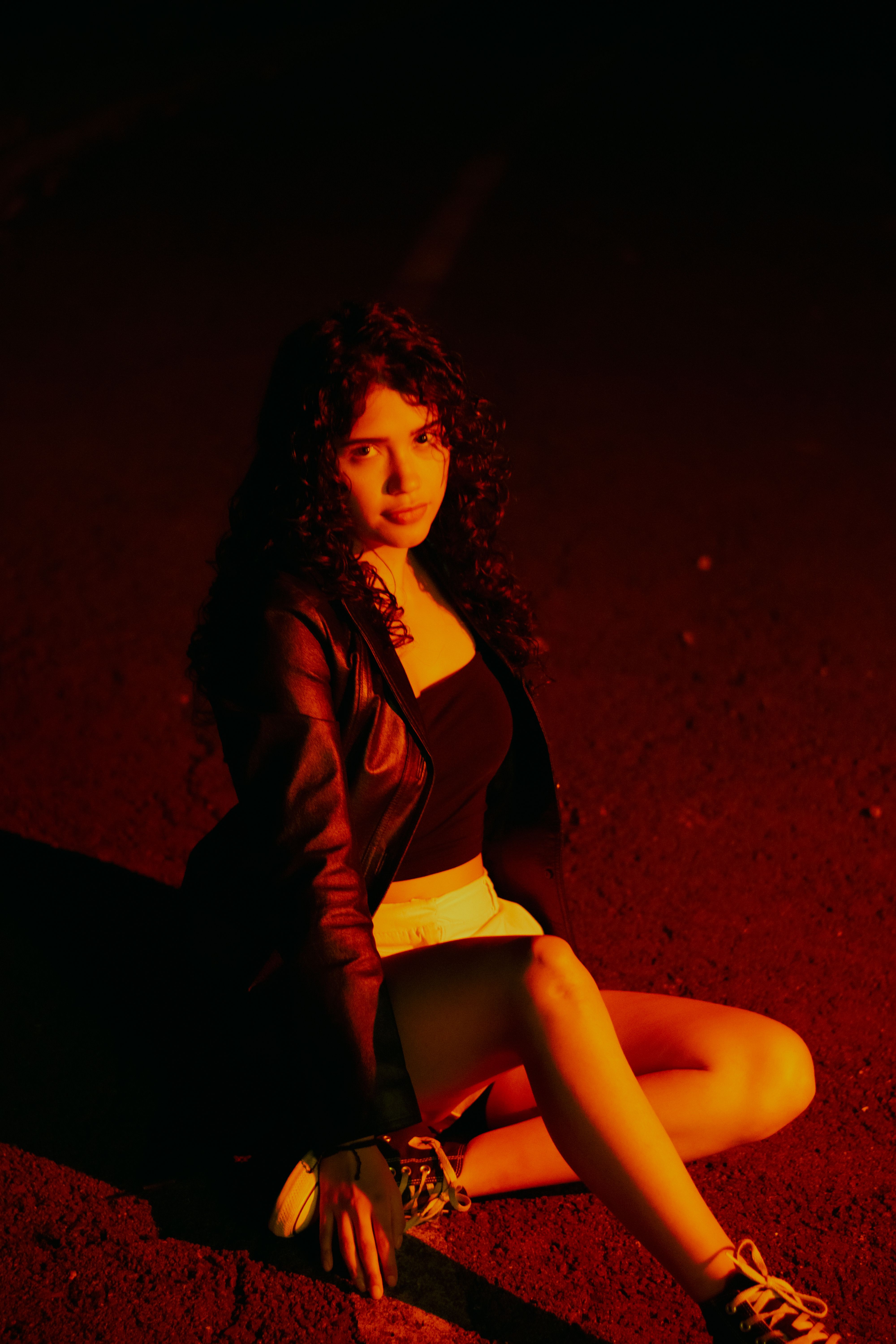 Moody Portrait of a Woman in Red Lighting · Free Stock Photo