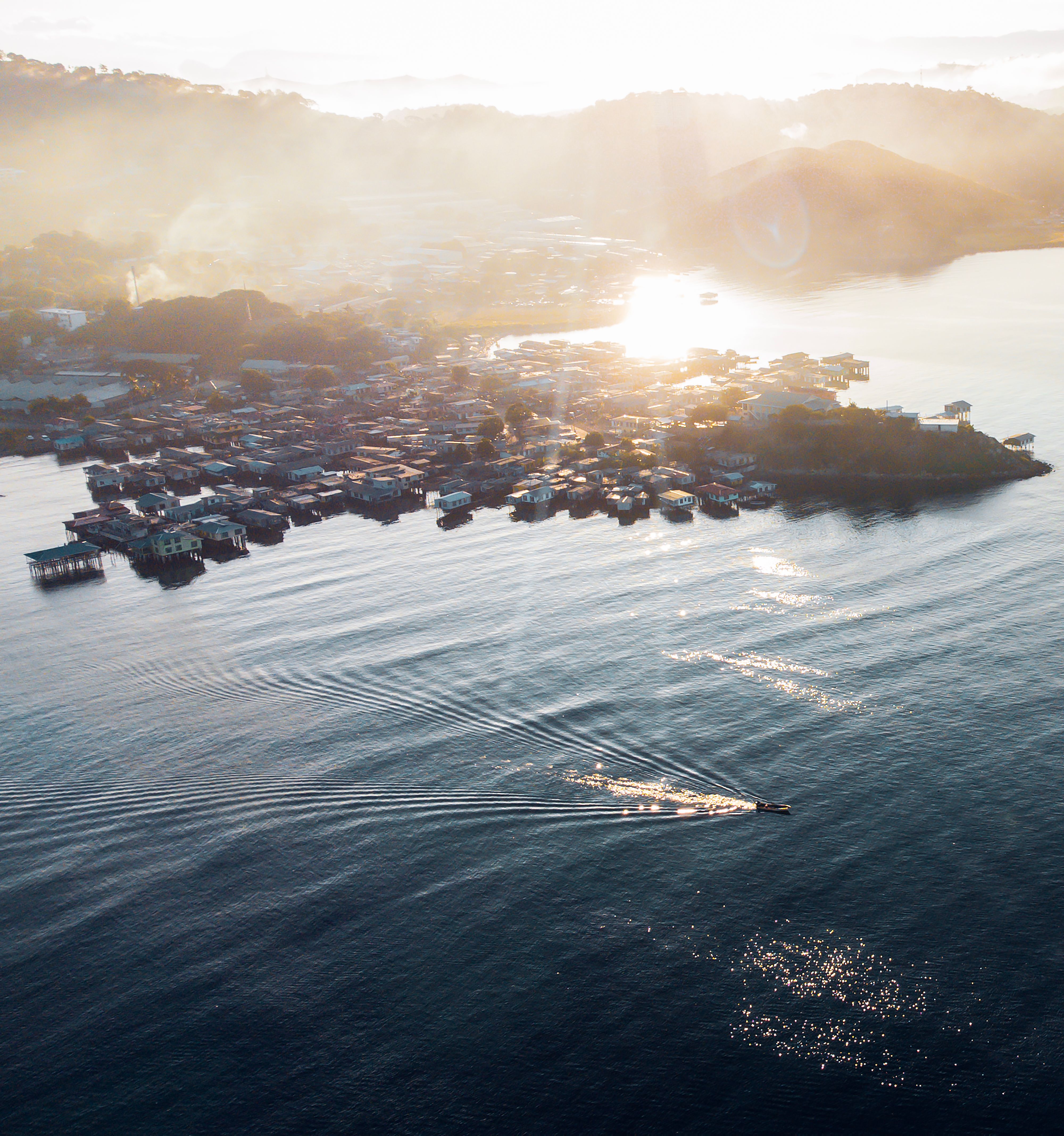 Aerial View of Coastal Village at Sunrise in Papua New Guinea · Free ...