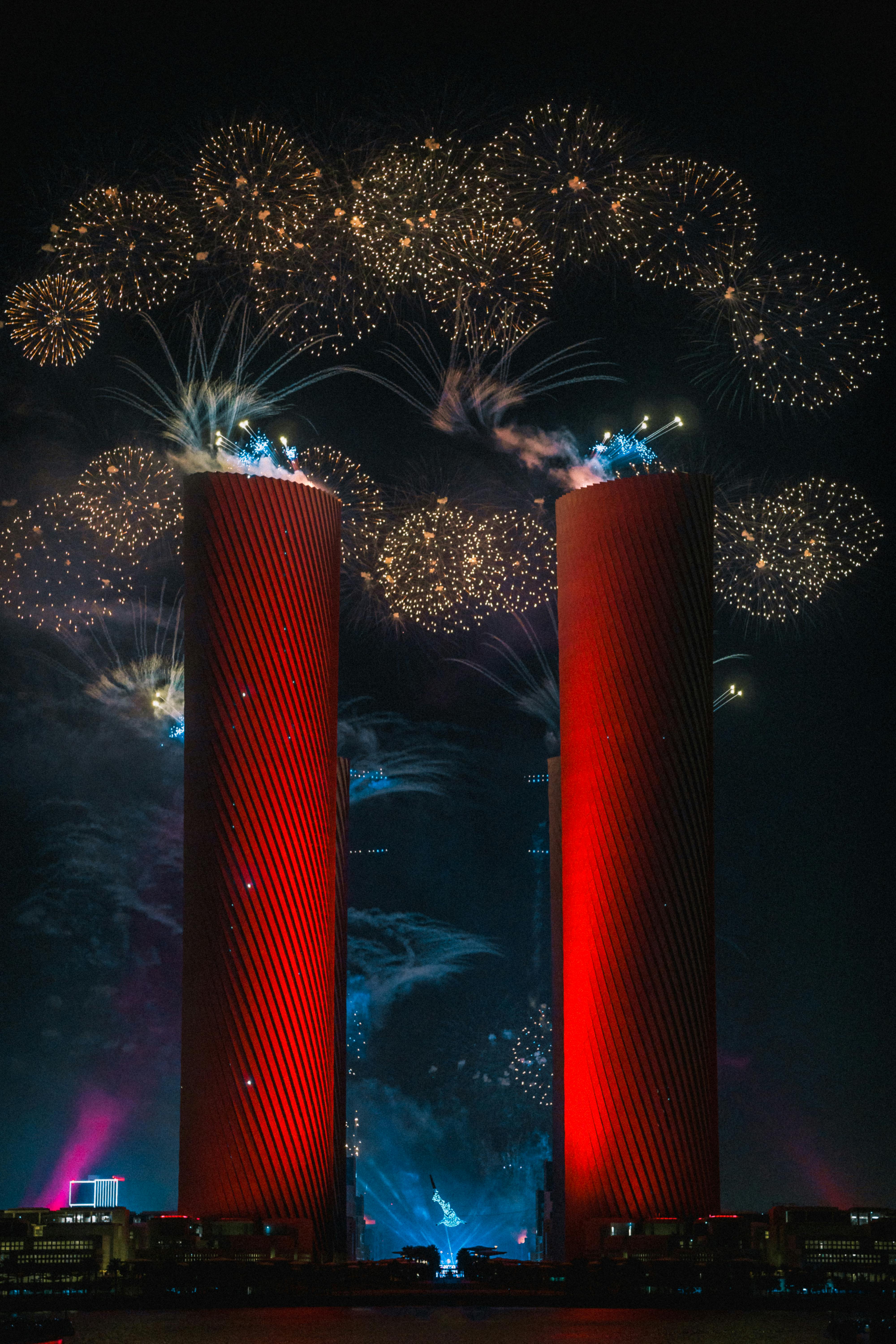 Spectacular Fireworks over Lusail Towers at Night · Free Stock Photo