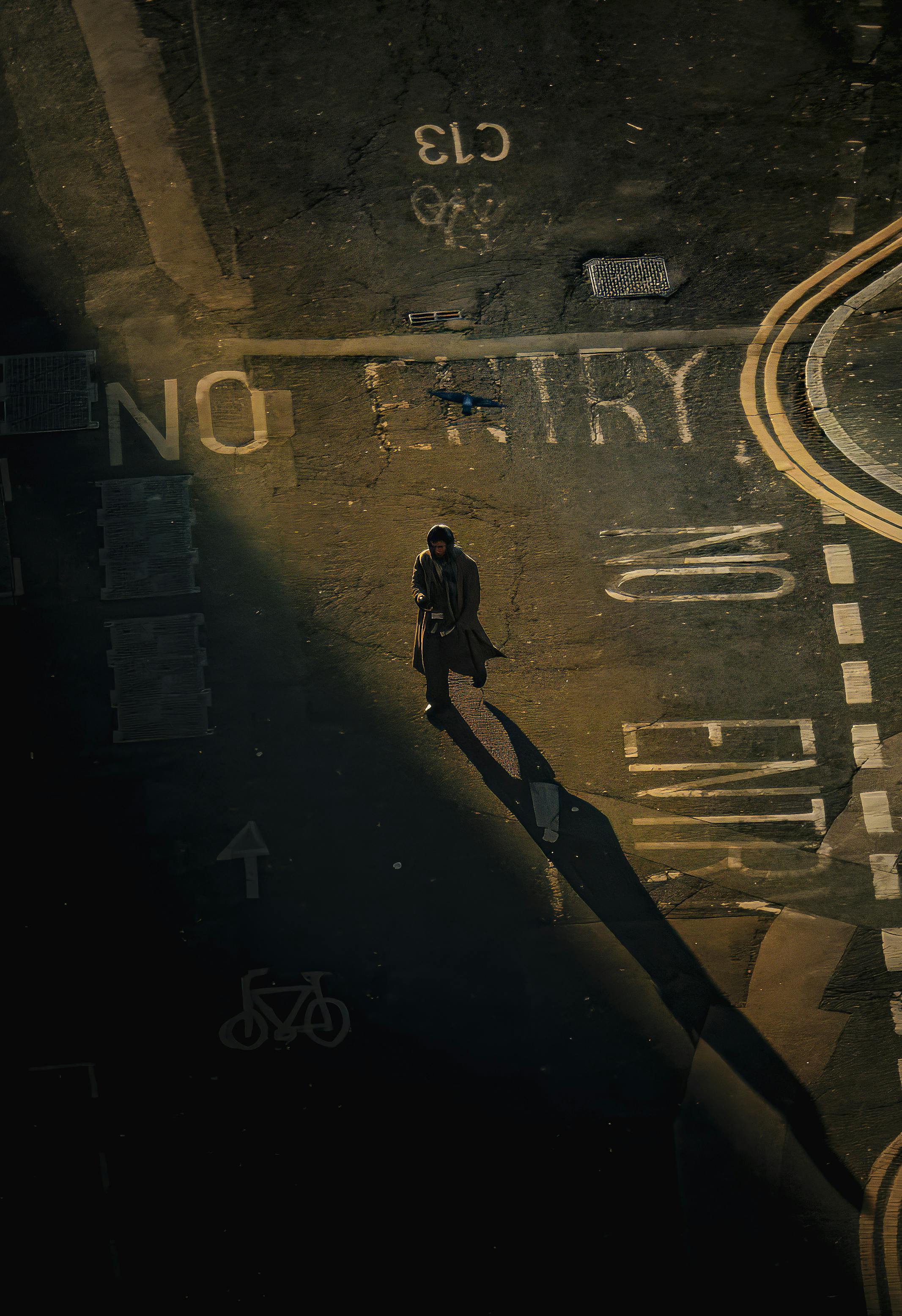 Street Scene with Shadow and Road Markings Overhead View · Free Stock Photo