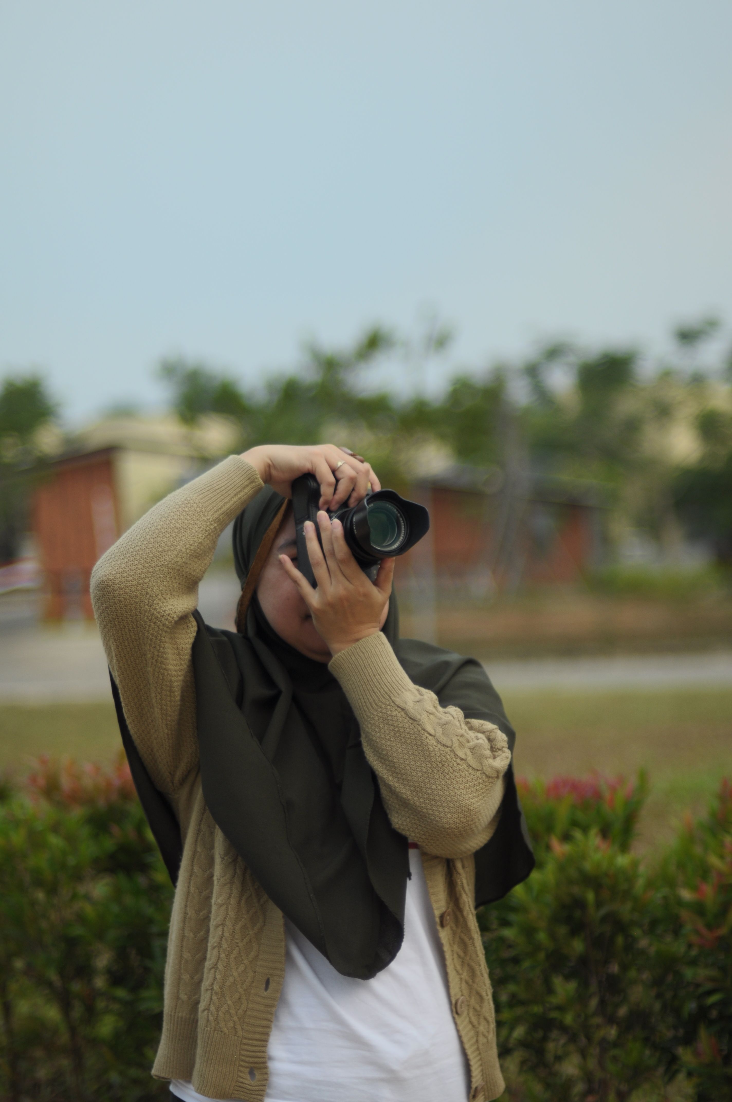 Female Photographer Capturing Nature in Park · Free Stock Photo