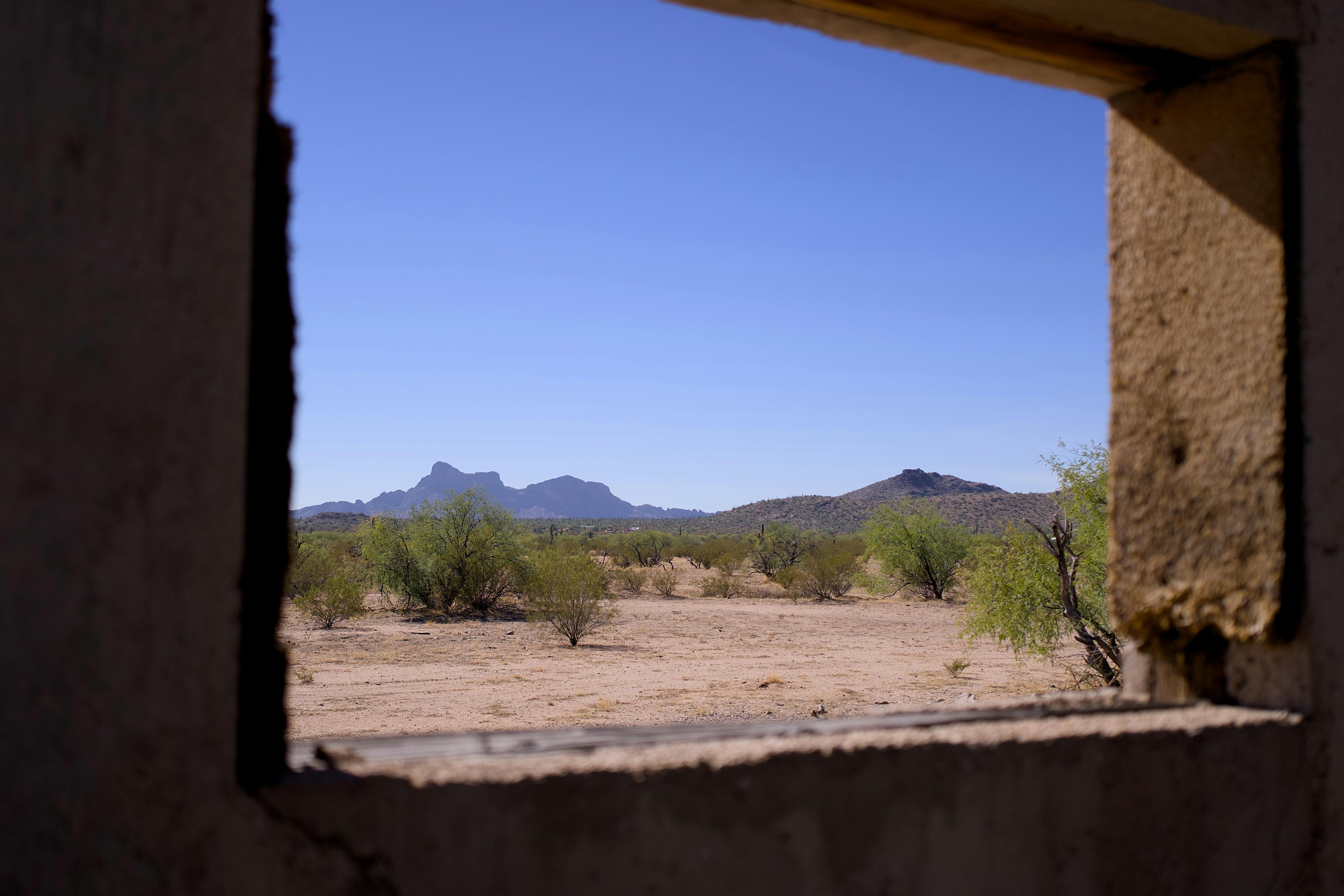 Desert Landscape View from Ruined Window Frame · Free Stock Photo