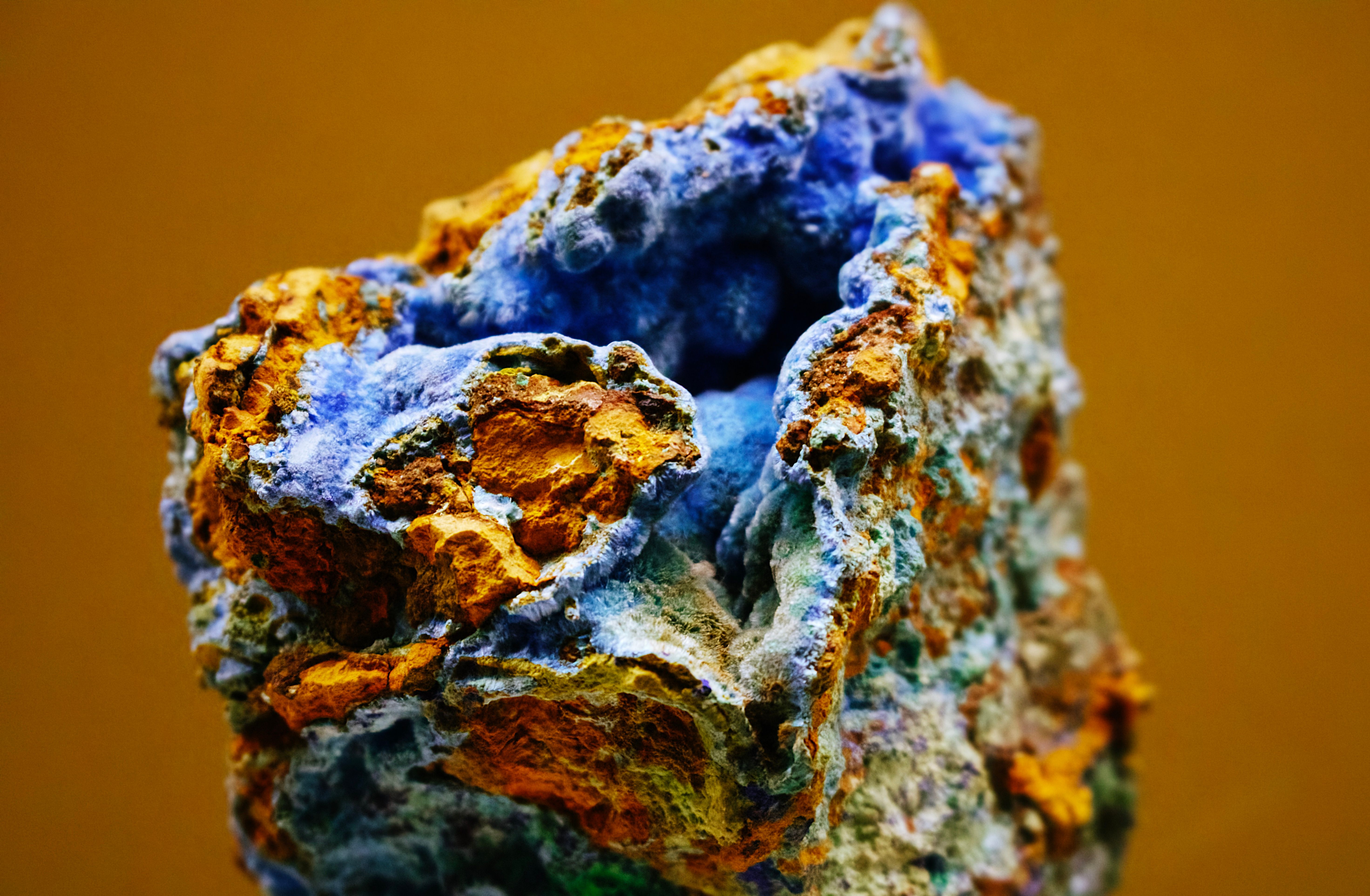 Vibrant Azure and Ochre Mineral Formation · Free Stock Photo