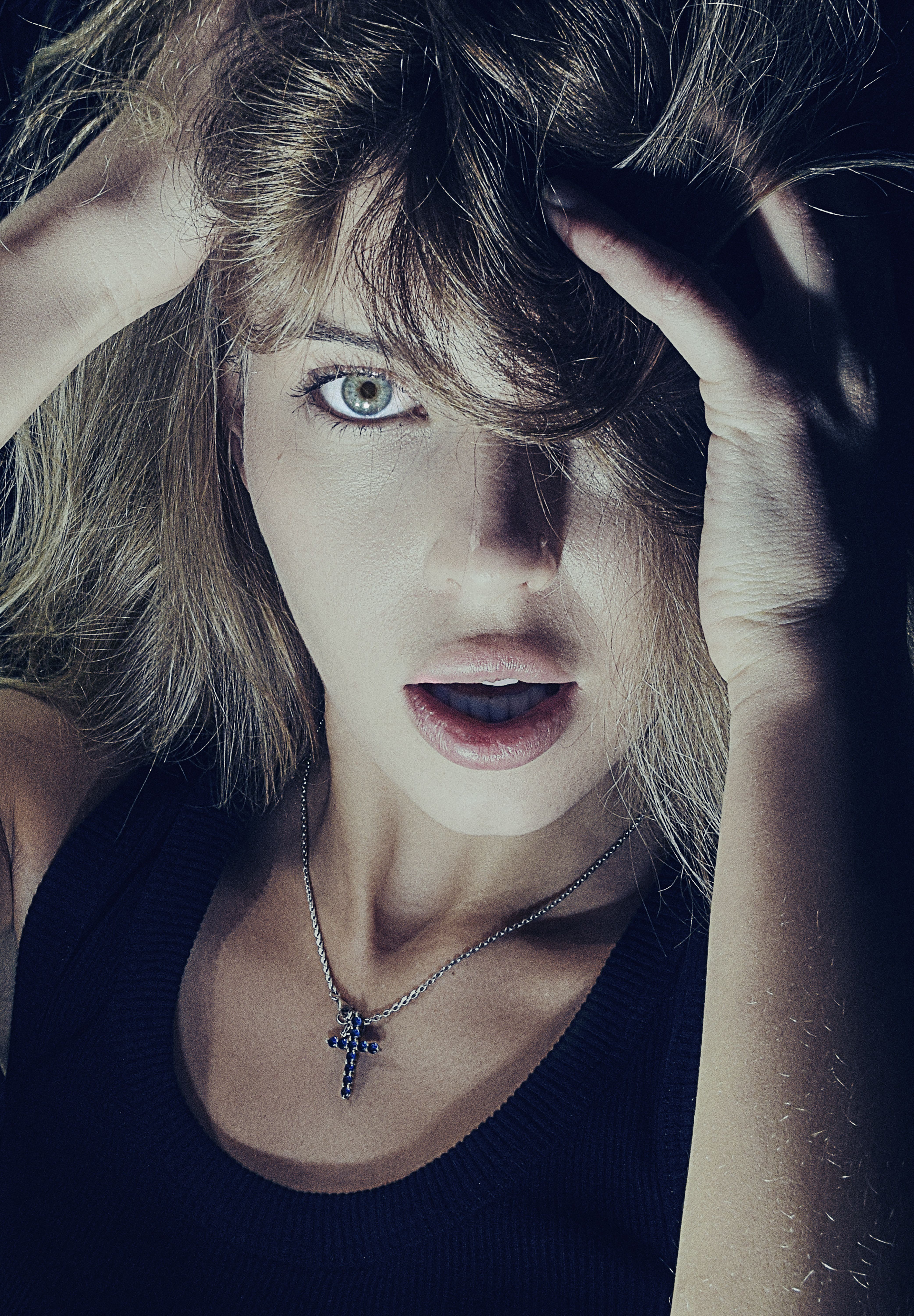 Dramatic Portrait of Woman with Intense Expression · Free Stock Photo