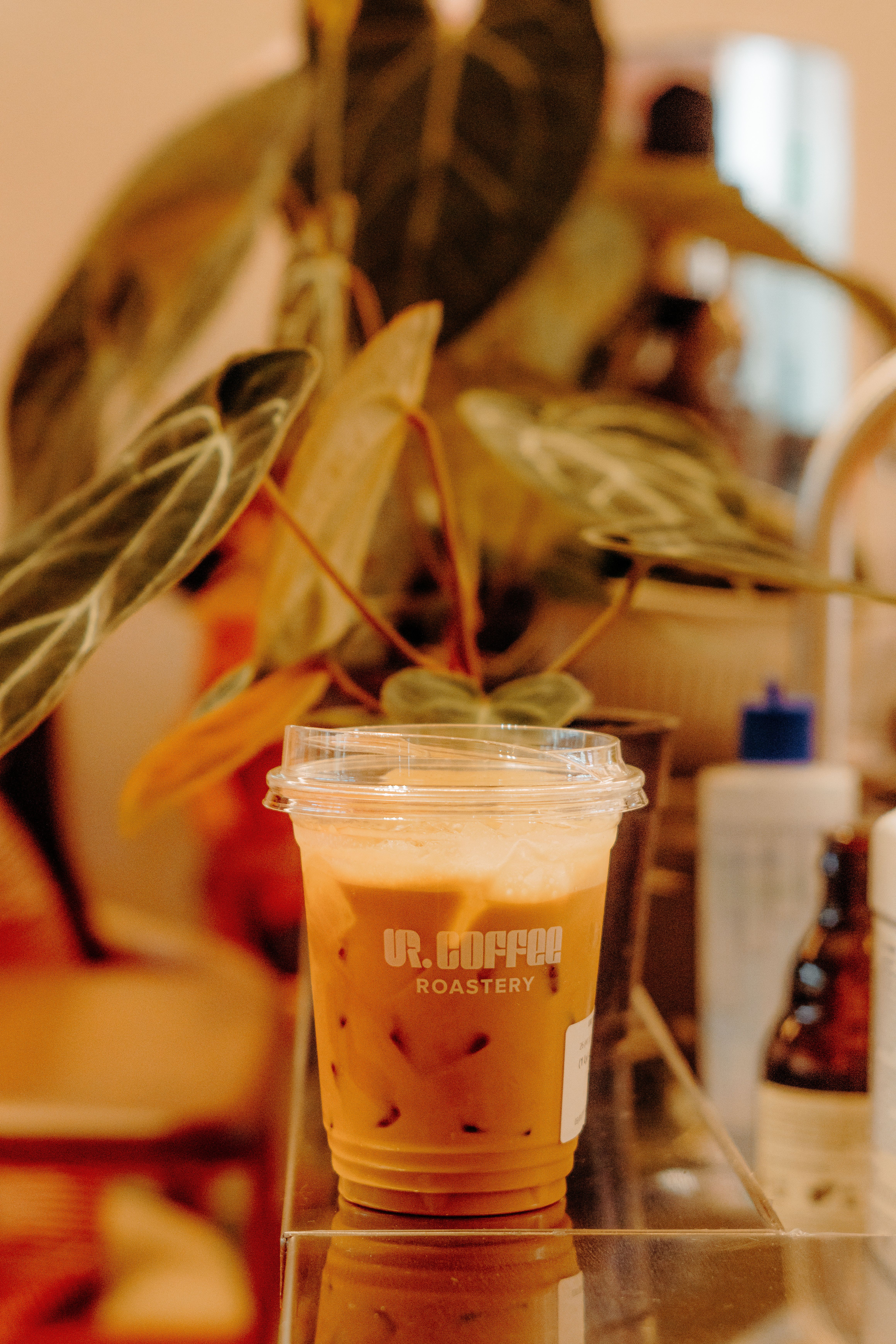 Chilled Iced Coffee in Urban Roastery Setting · Free Stock Photo
