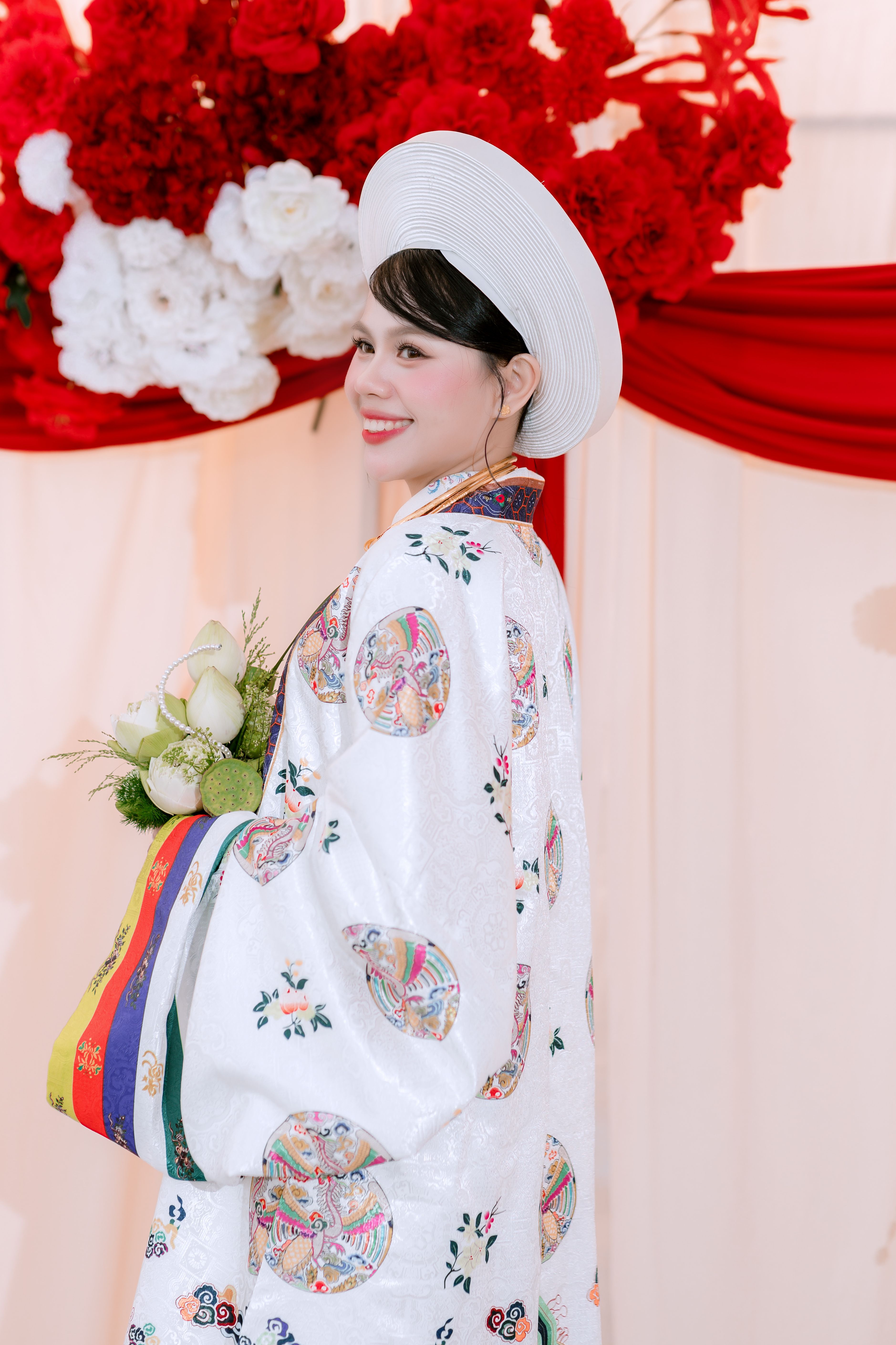 Elegant Woman in Traditional Ceremony Attire · Free Stock Photo
