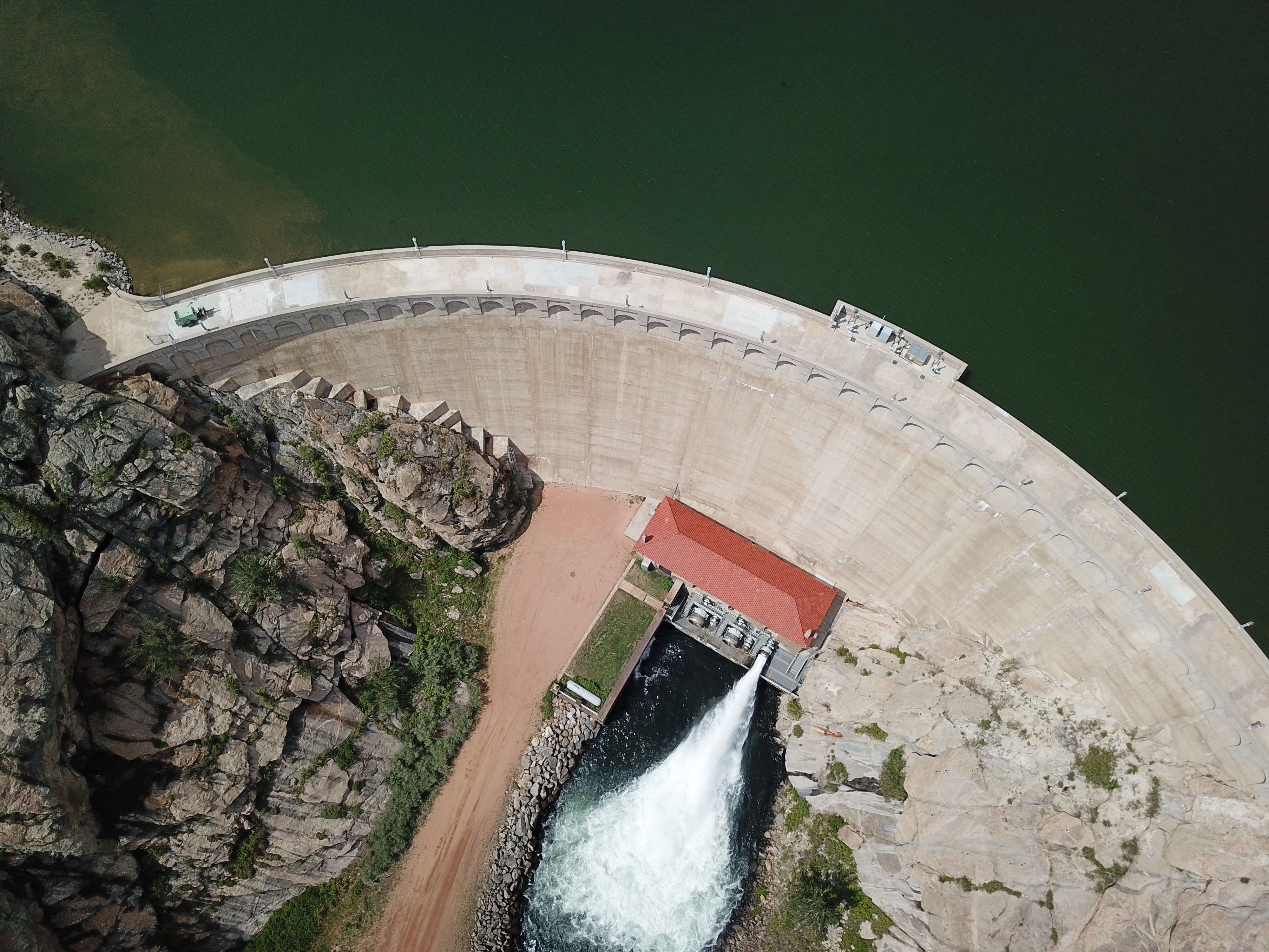 Aerial View of a Hydroelectric Dam and Reservoir · Free Stock Photo
