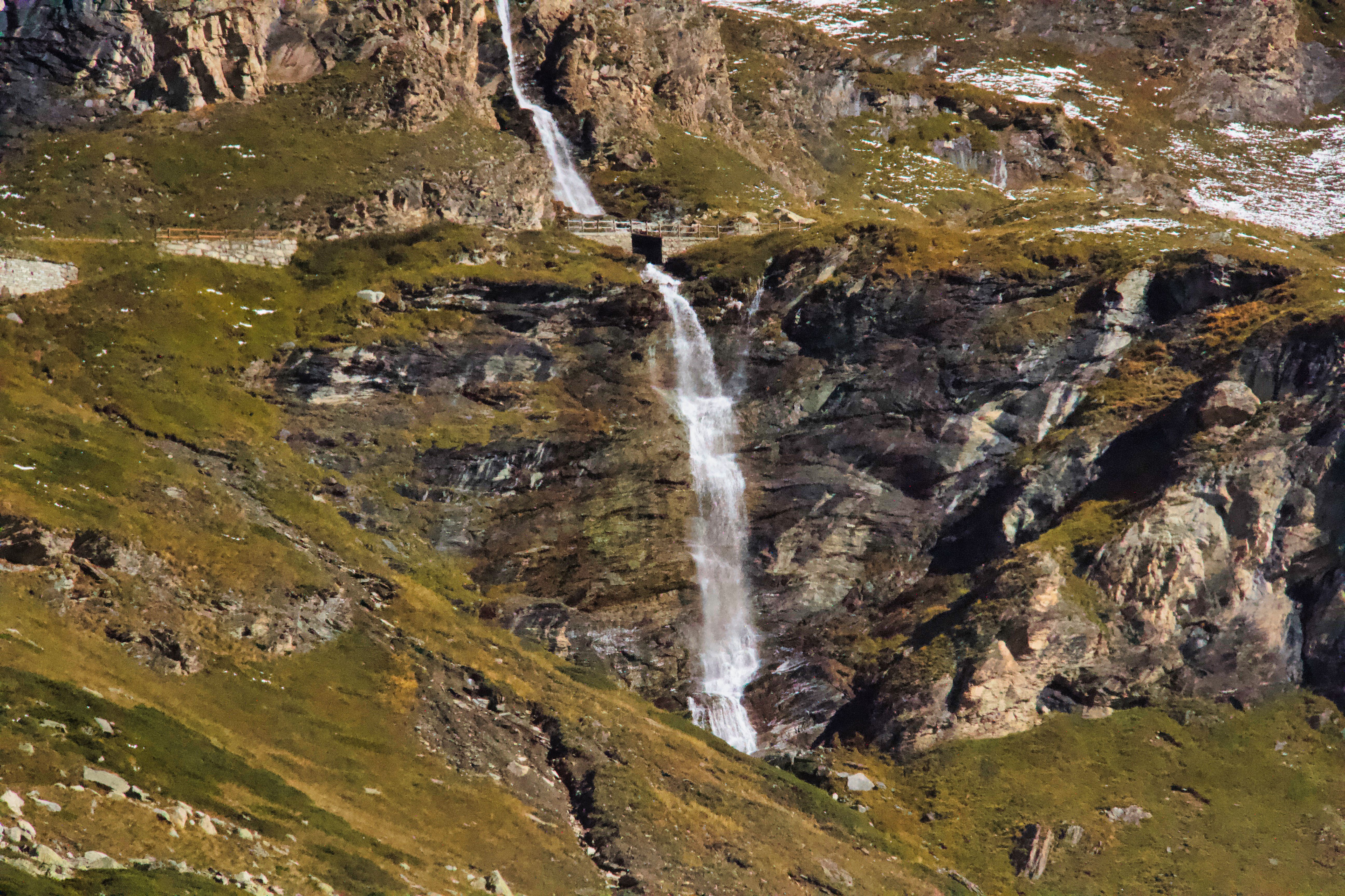 Waterfall in Breuil-Cervinia's Rocky Landscape · Free Stock Photo