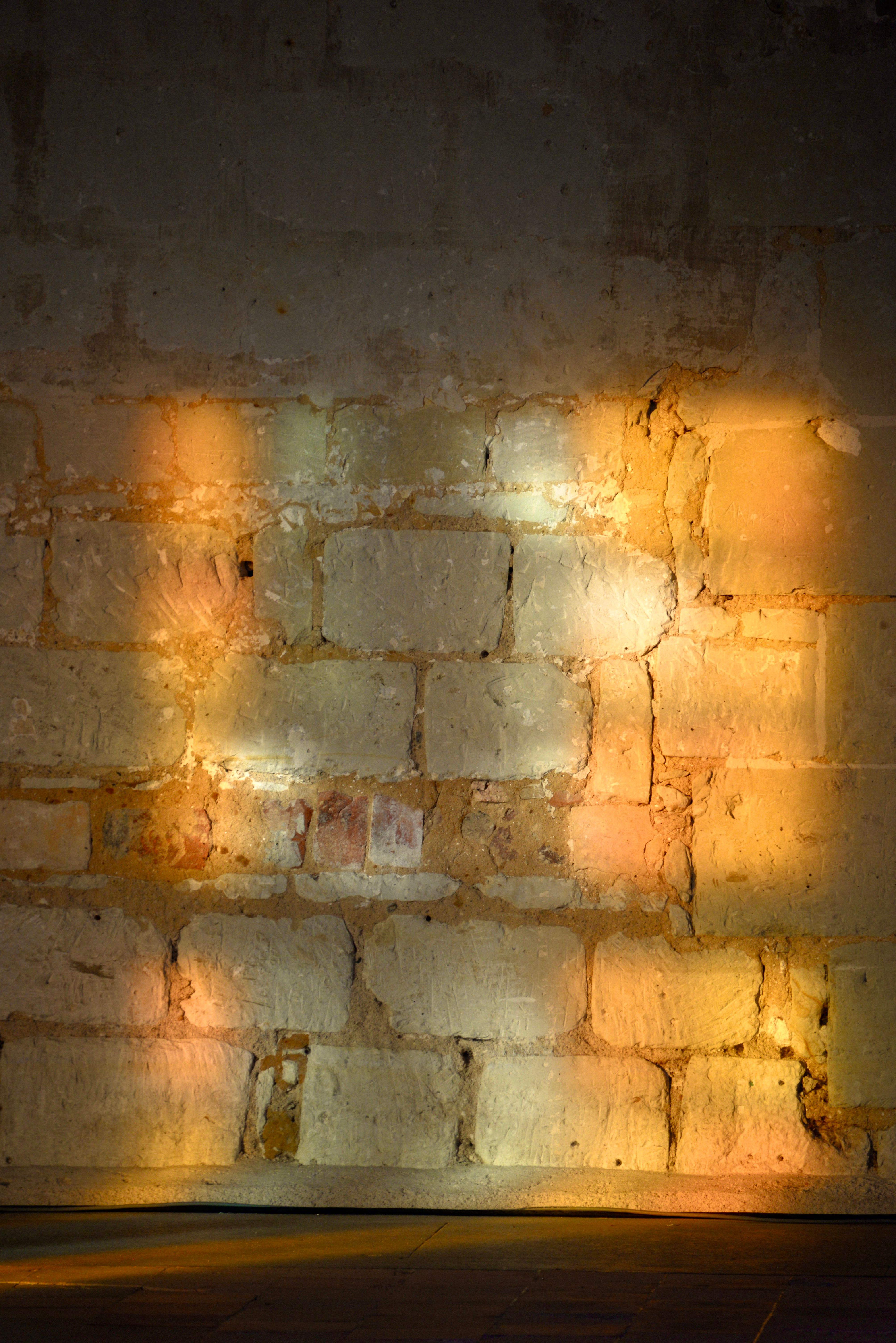 Colorful Light Reflections on Stone Wall · Free Stock Photo