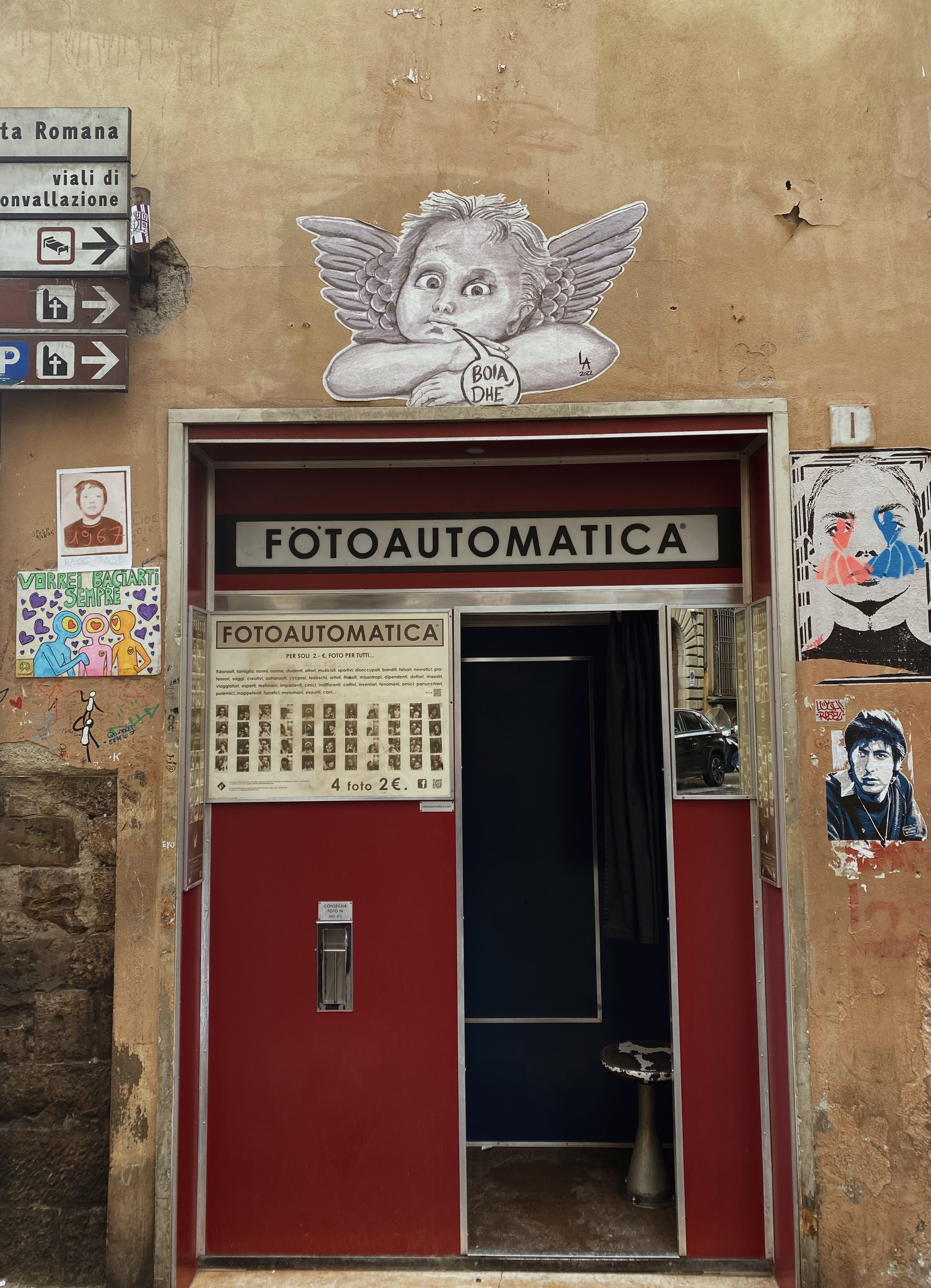 Retro Photo Booth with Angel Artwork in Tuscany · Free Stock Photo
