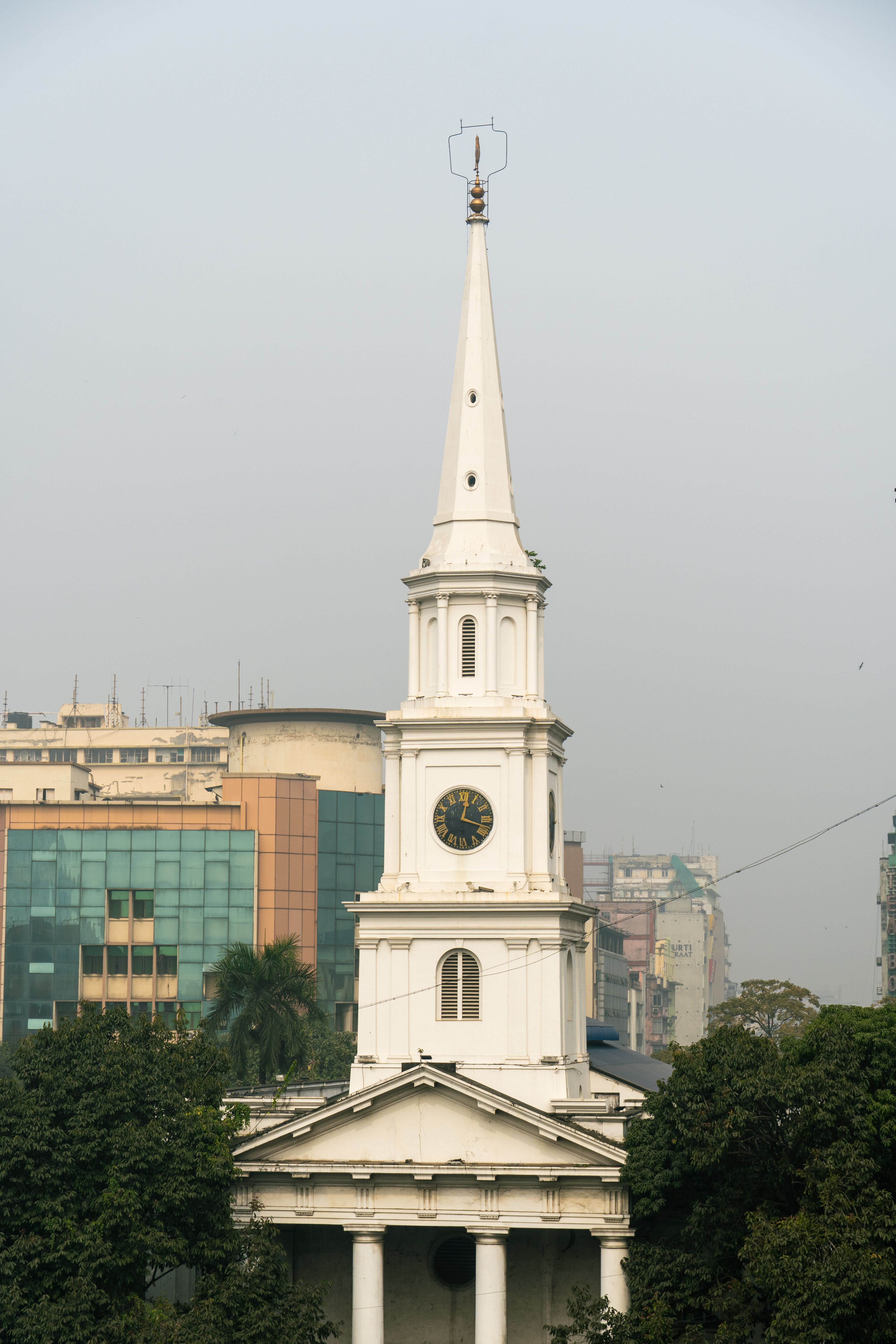 Historic Church Tower in Urban Setting · Free Stock Photo