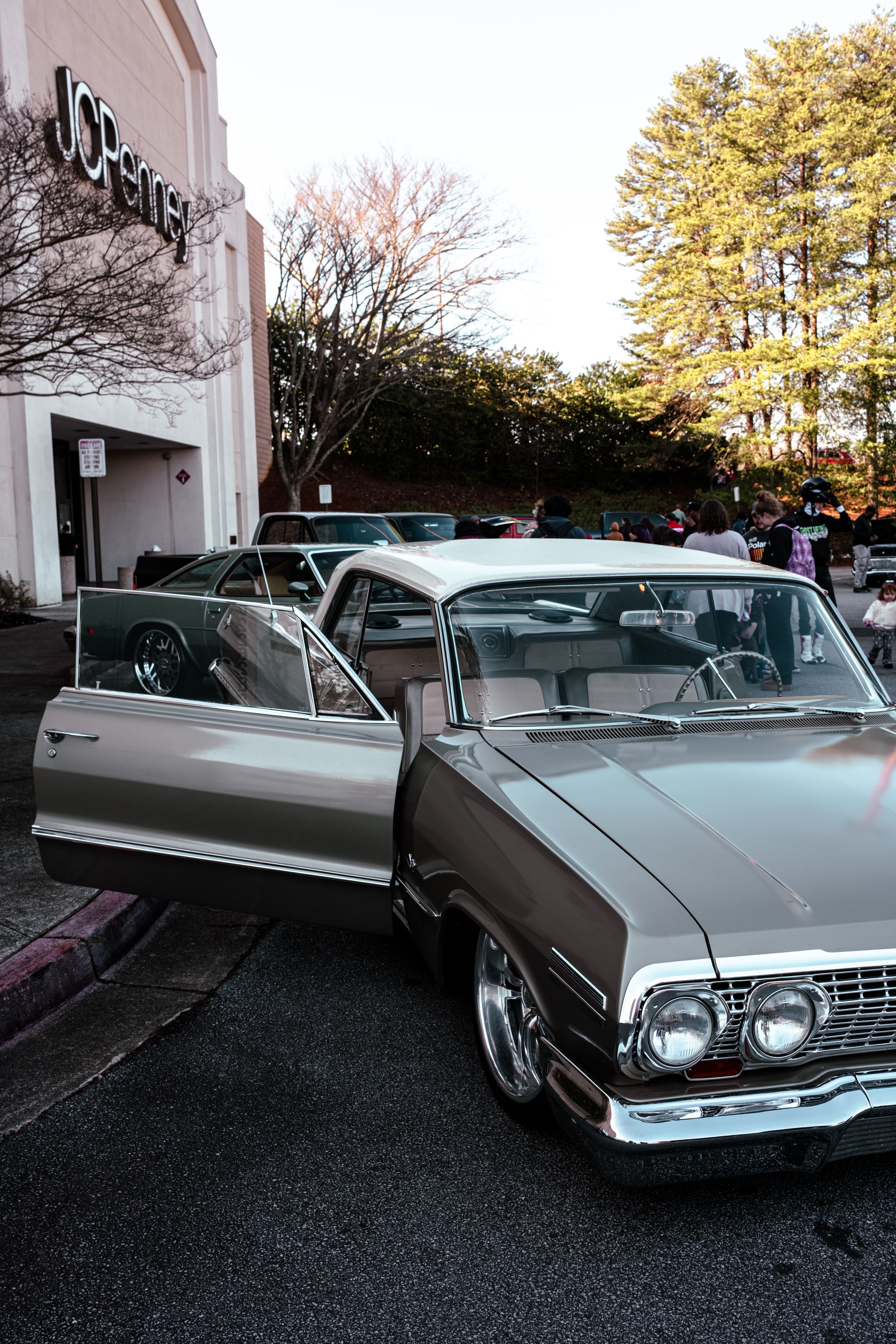 Classic Car Parked Outside JCPenney Store · Free Stock Photo