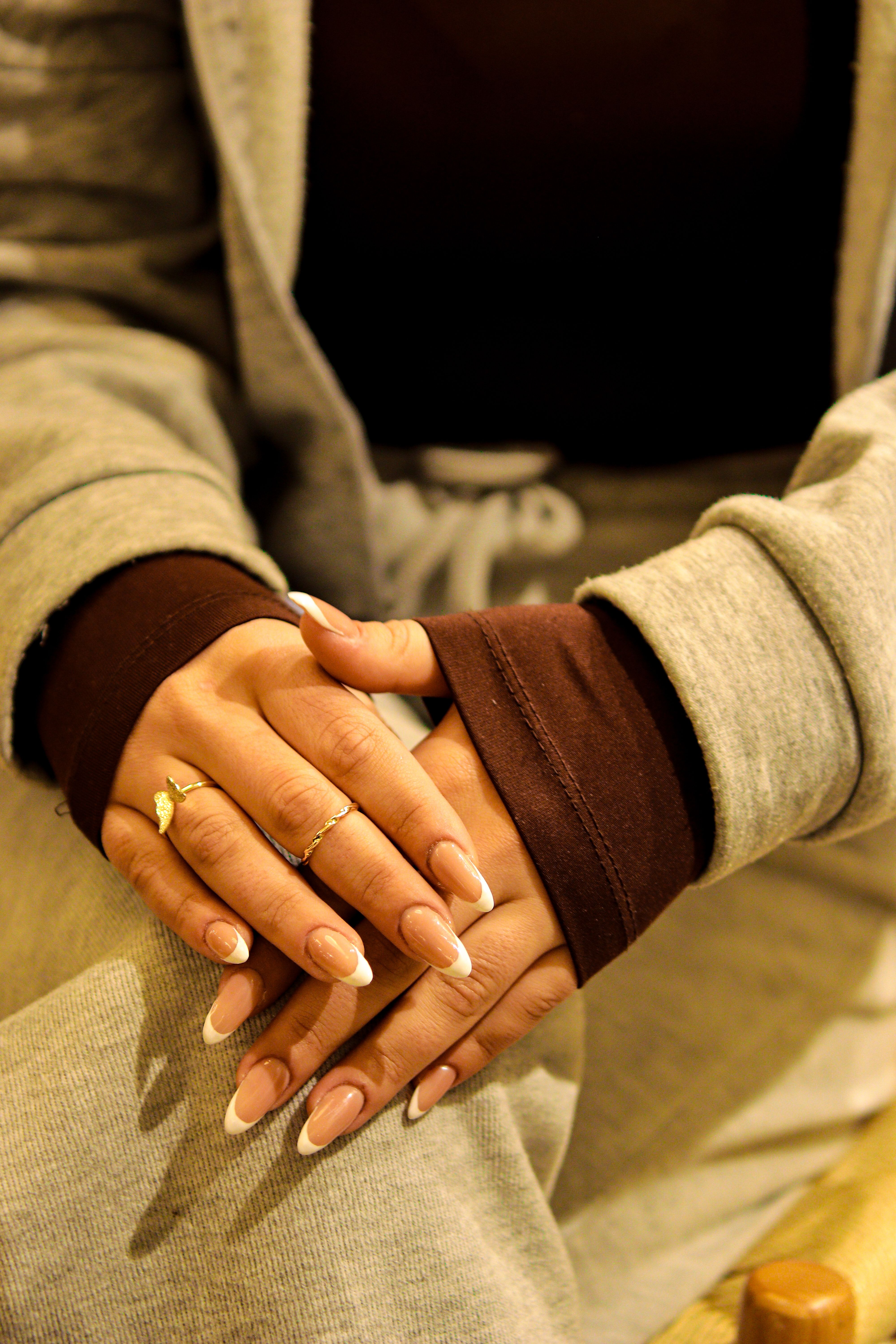Close-up Photo of Silver Rings worn by a Person · Free Stock Photo