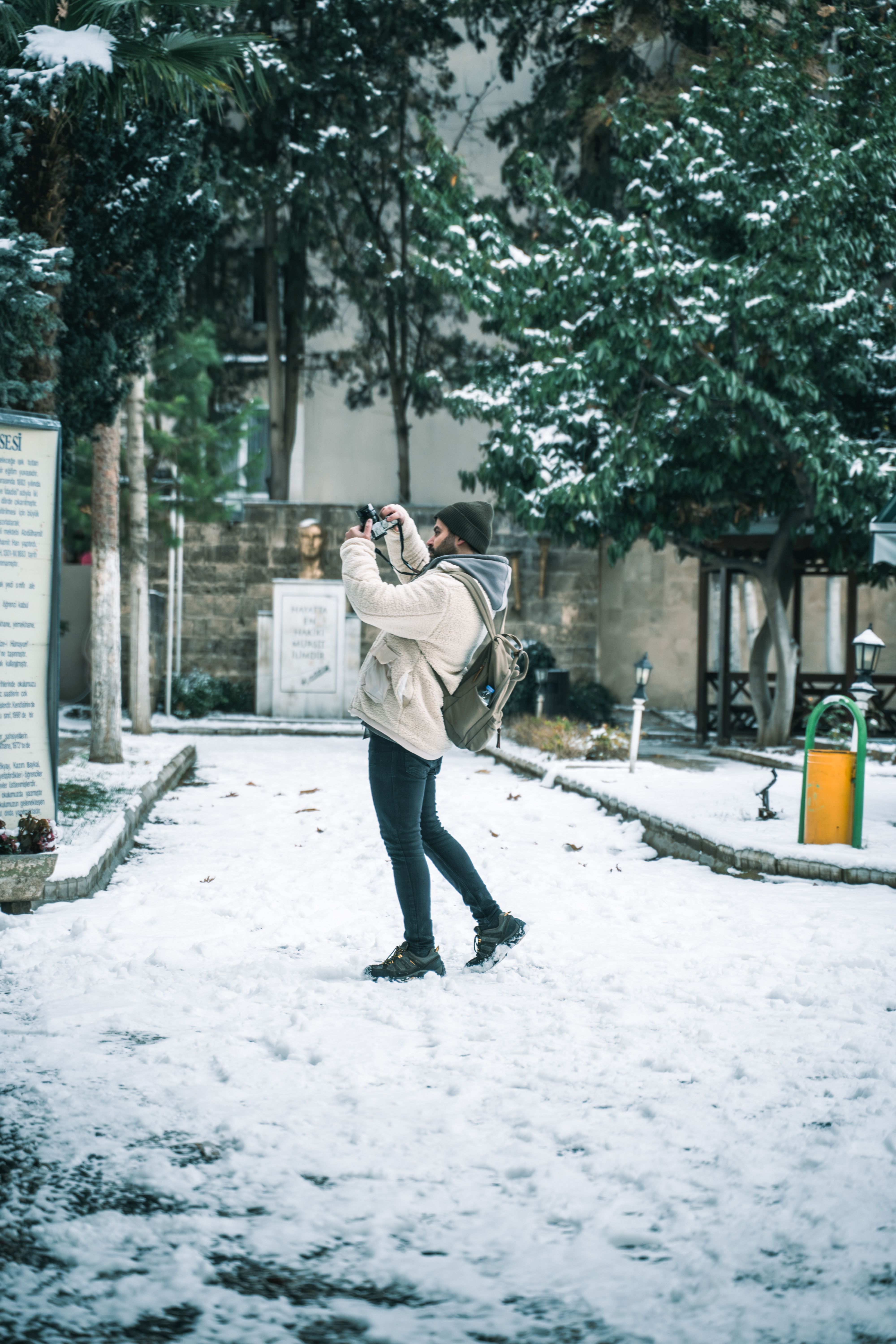 Photographer Capturing Snowy Outdoor Scene · Free Stock Photo