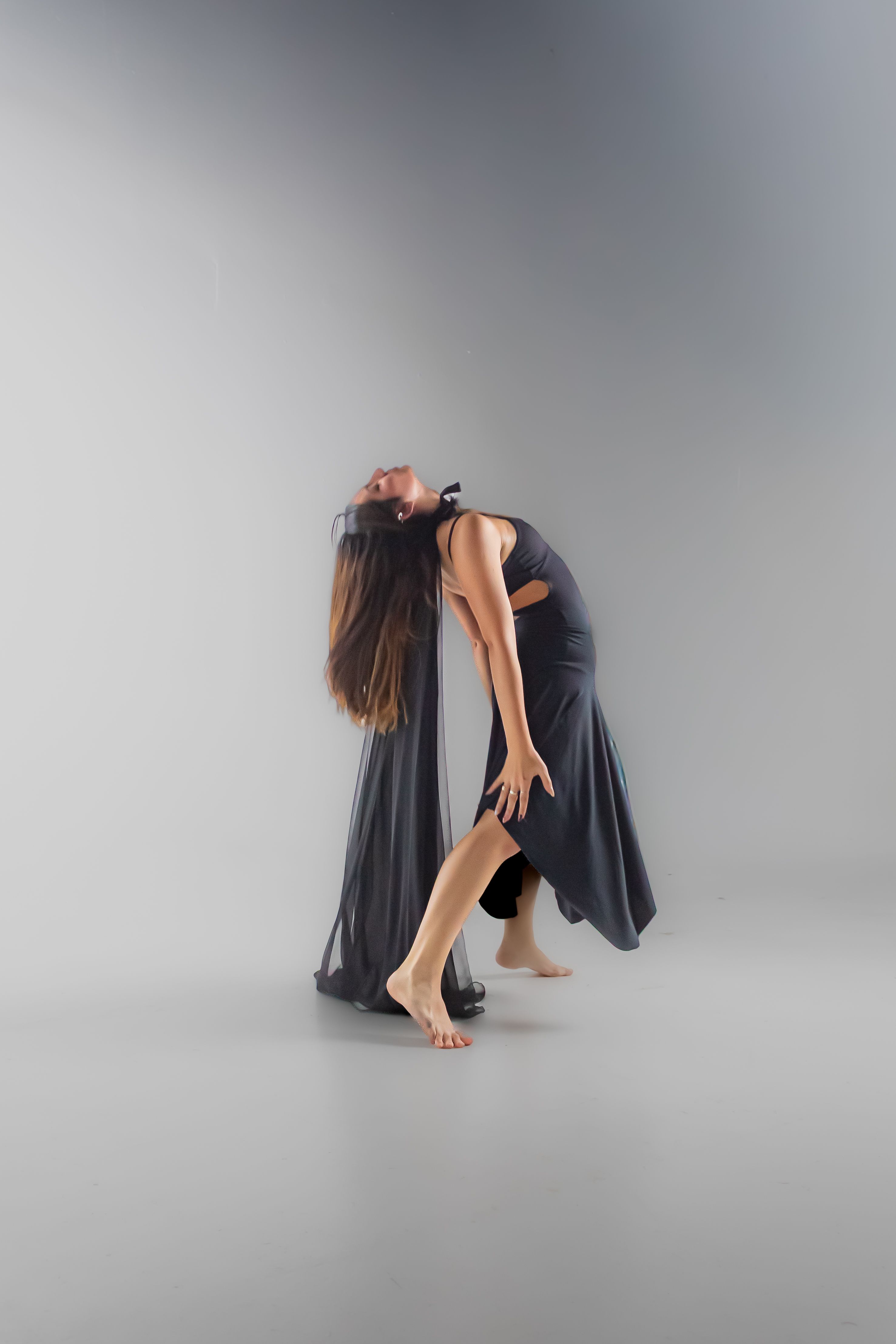 Elegant Contemporary Dance Pose in Studio Setting · Free Stock Photo