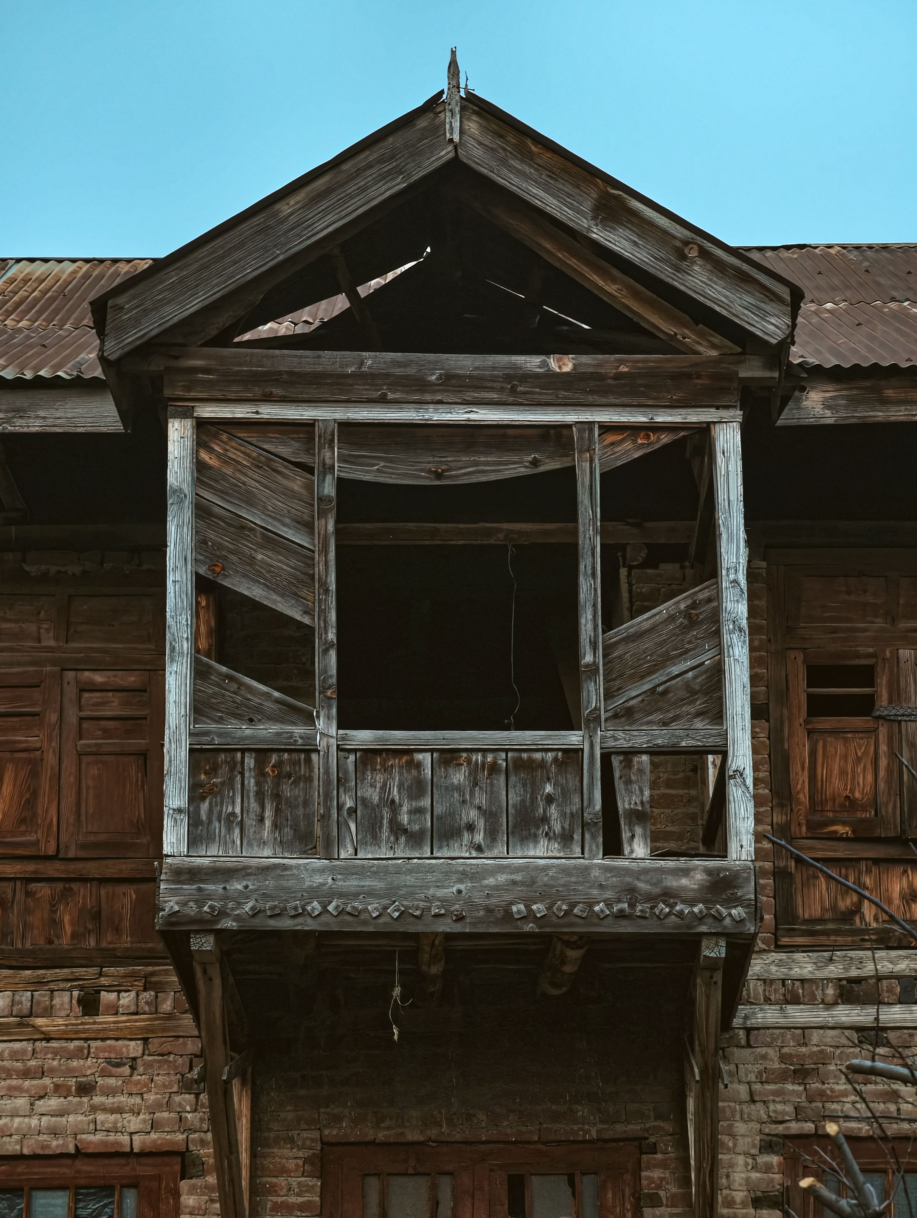 Rustic Old Building with Wooden Details · Free Stock Photo