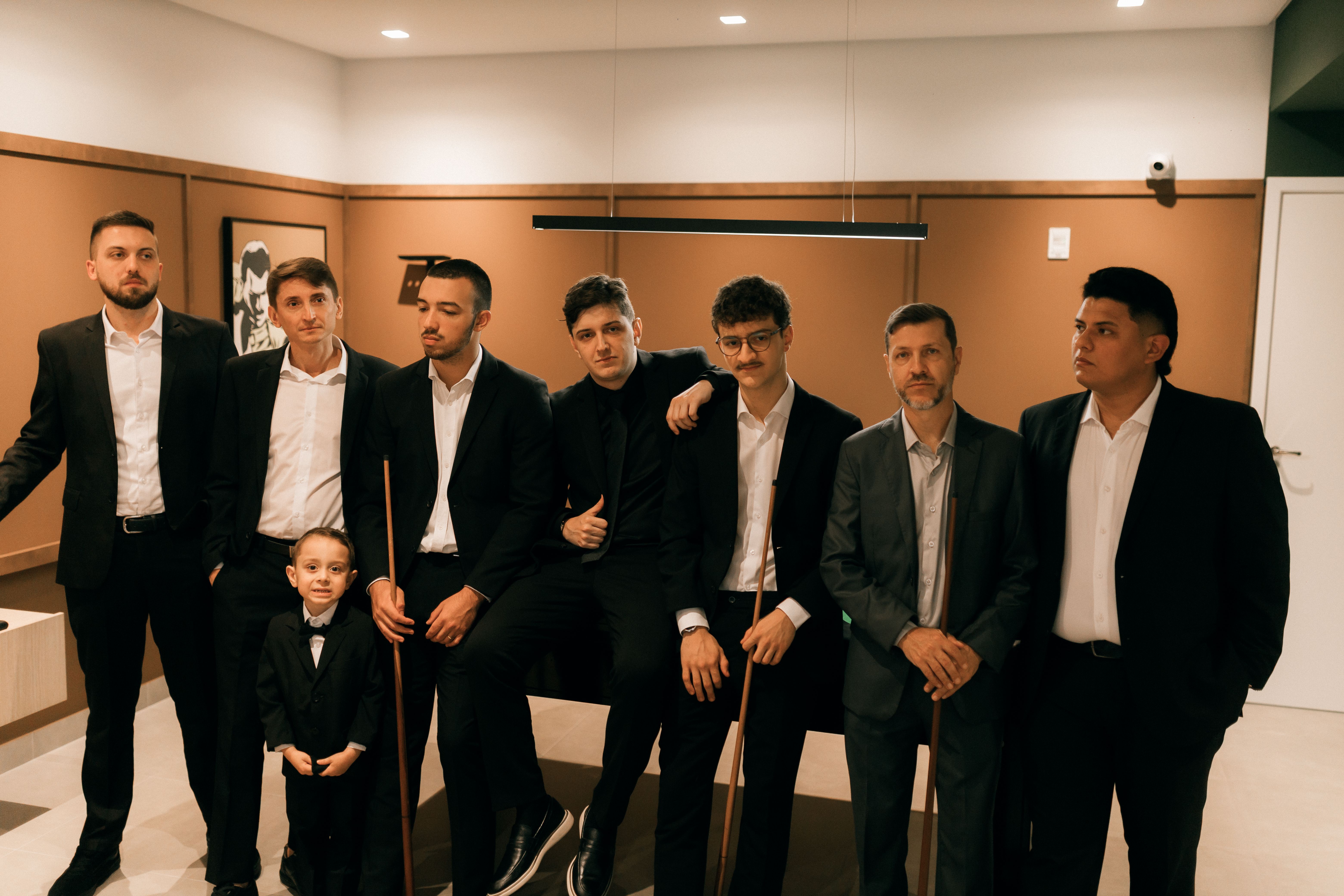 Group Portrait of Men and Boy in Formal Attire · Free Stock Photo