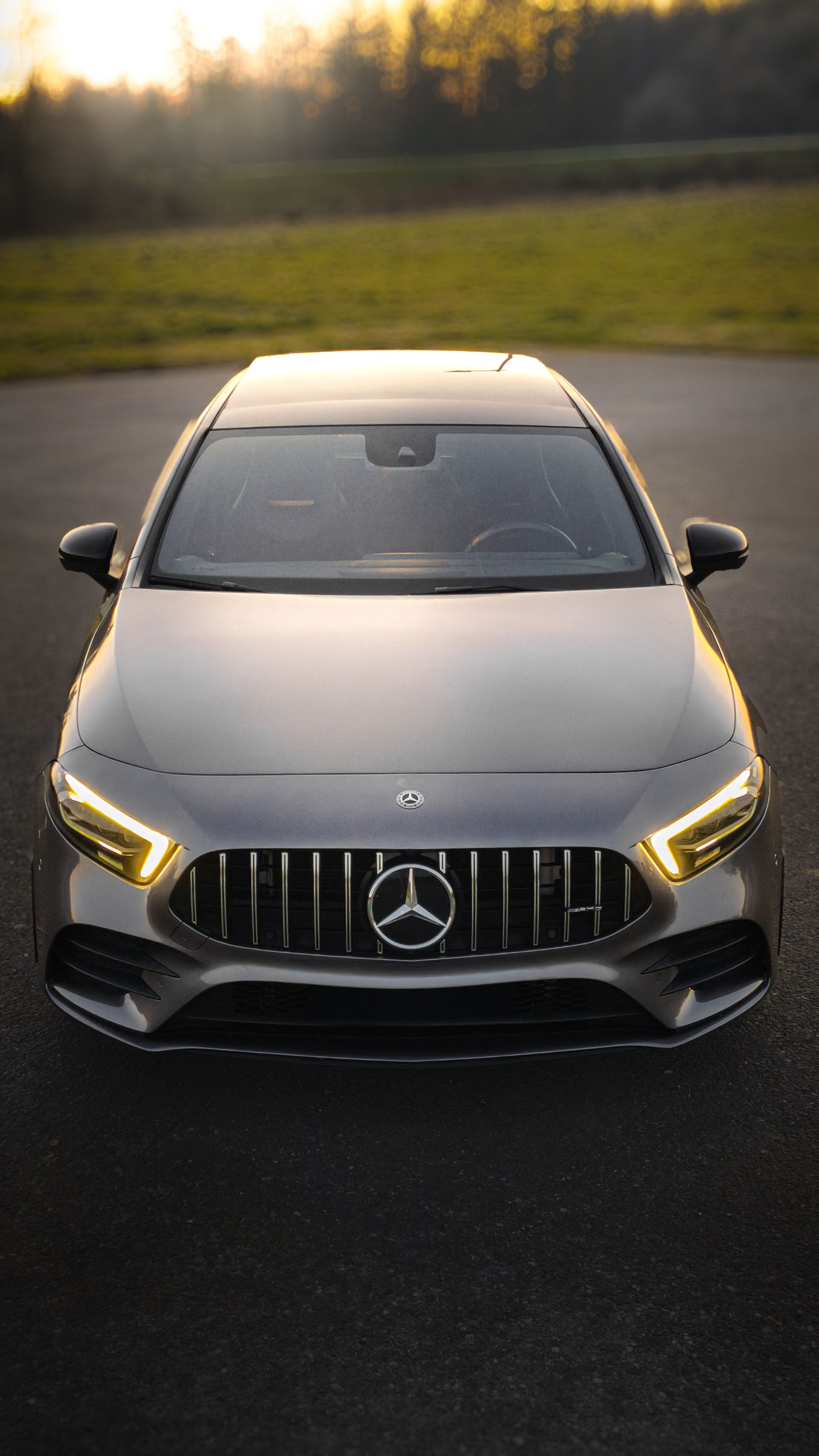 Luxury Car in Scenic Outdoor Setting at Sunset · Free Stock Photo
