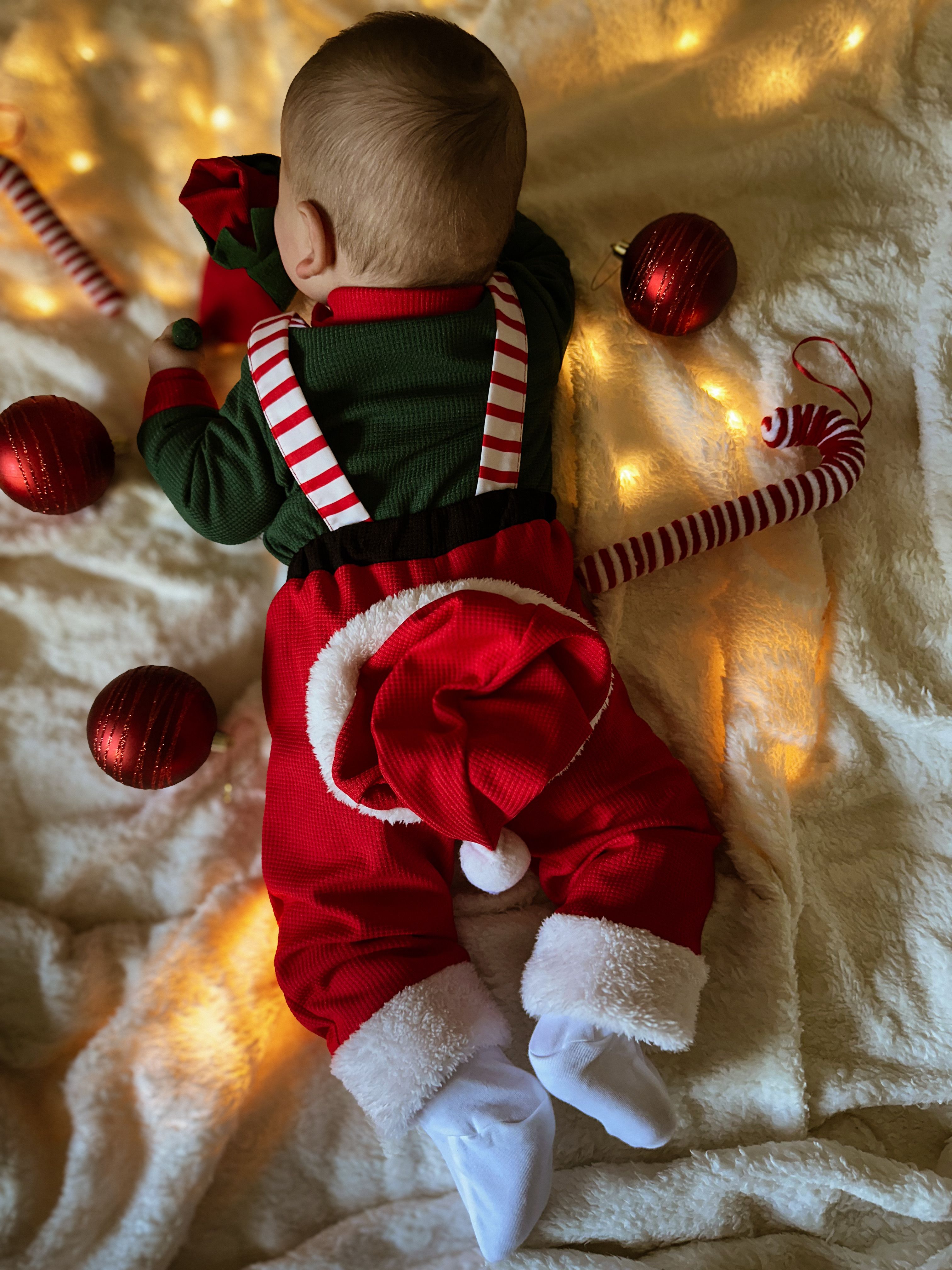 Adorable Baby in Festive Christmas Outfit · Free Stock Photo
