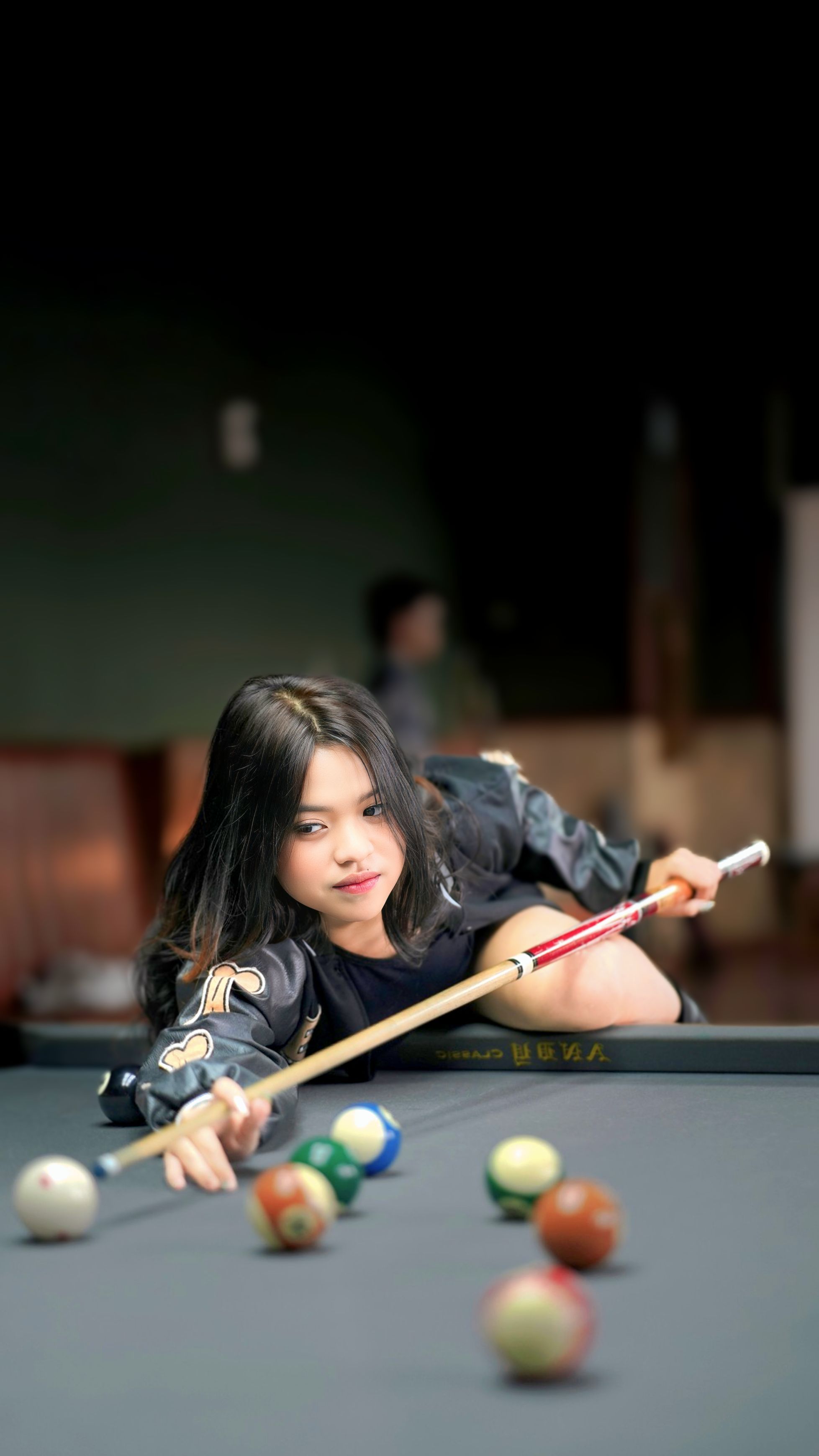 Young Woman Playing Billiards Focused Shot · Free Stock Photo