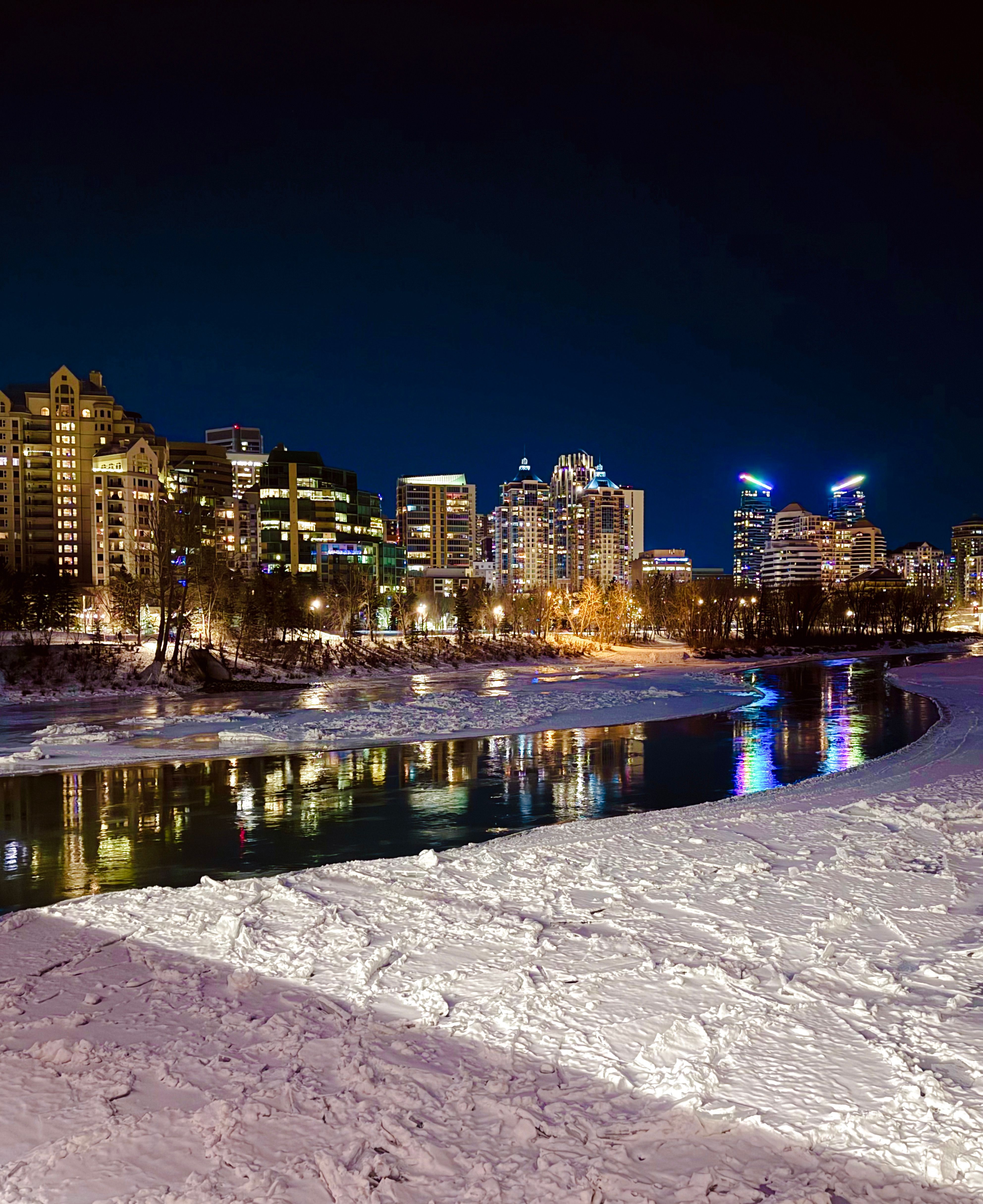 Winter Night Skyline of Calgary Along the Bow River · Free Stock Photo