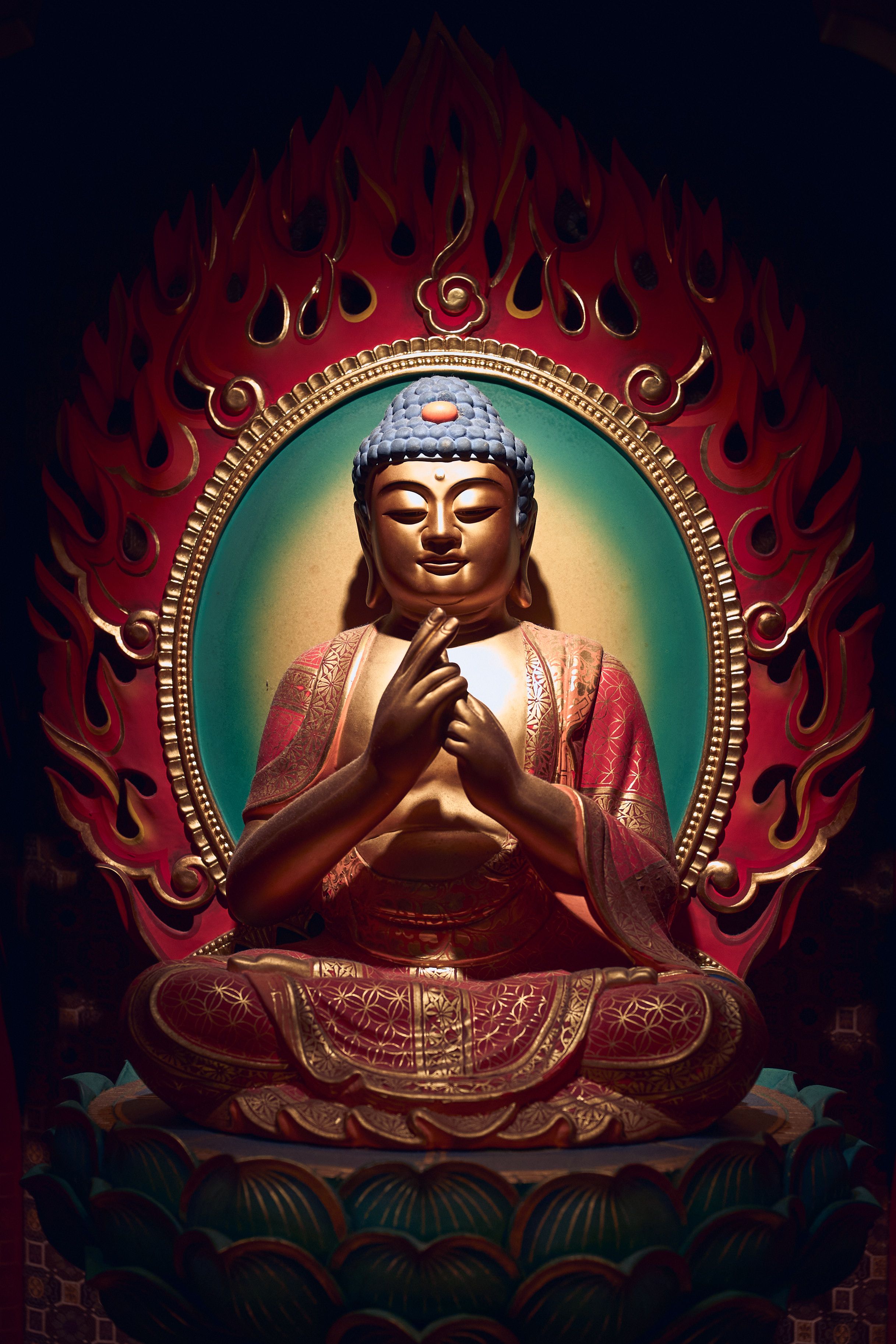 Golden Buddha Statue Surrounded by Flames · Free Stock Photo
