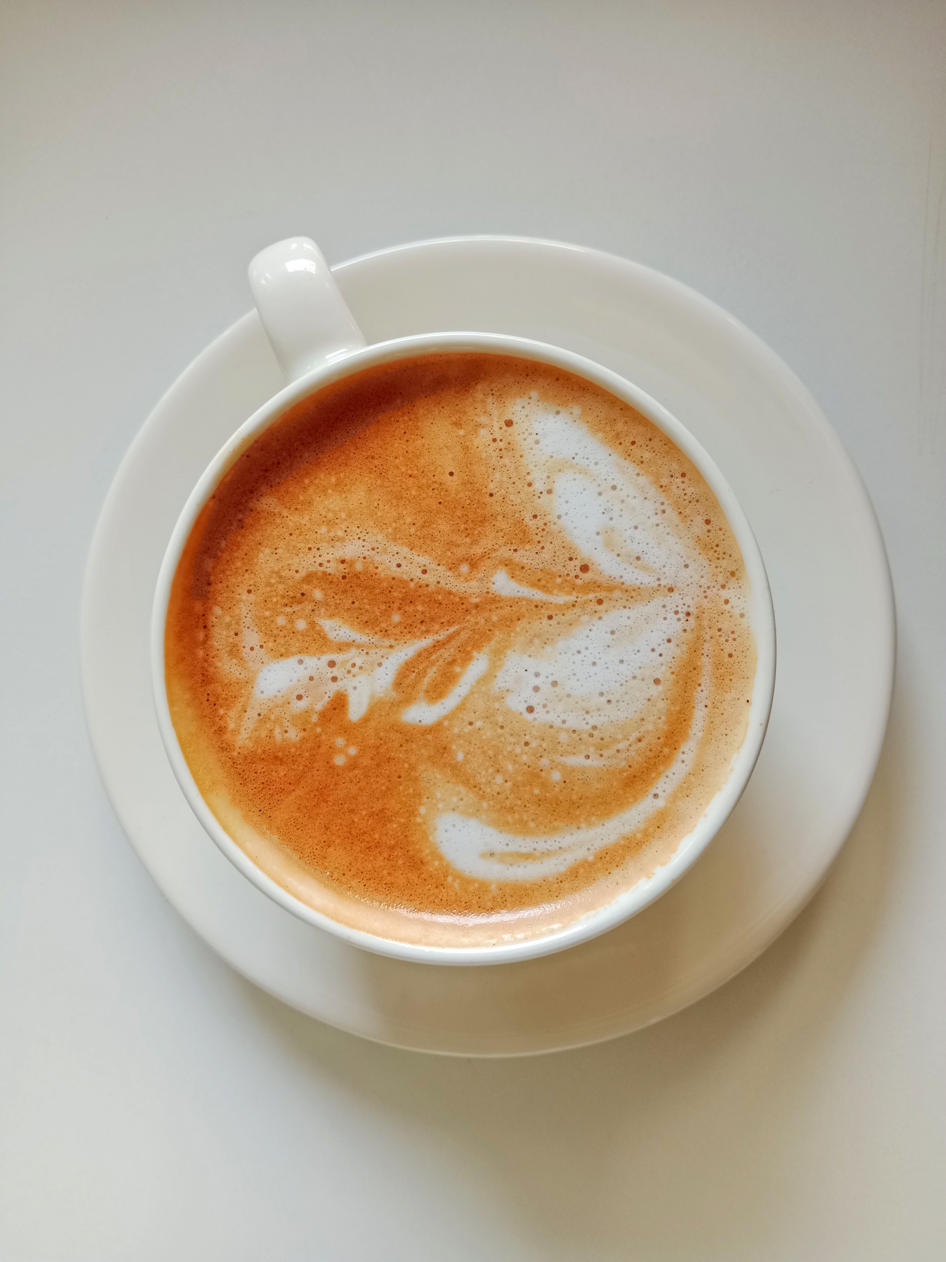 Aesthetic Flat Lay of Coffee Latte Art · Free Stock Photo