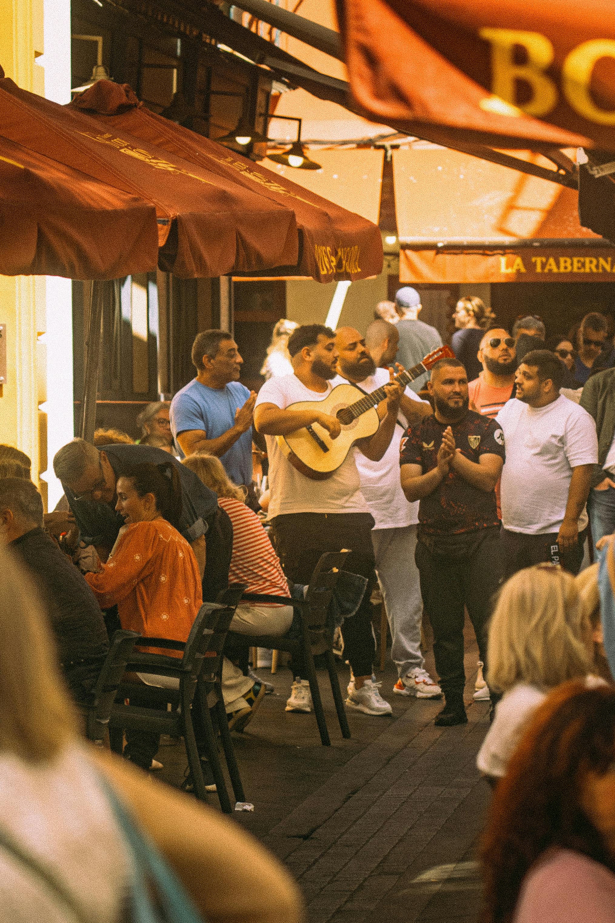 Street Musicians Playing in Seville's Historic Area · Free Stock Photo