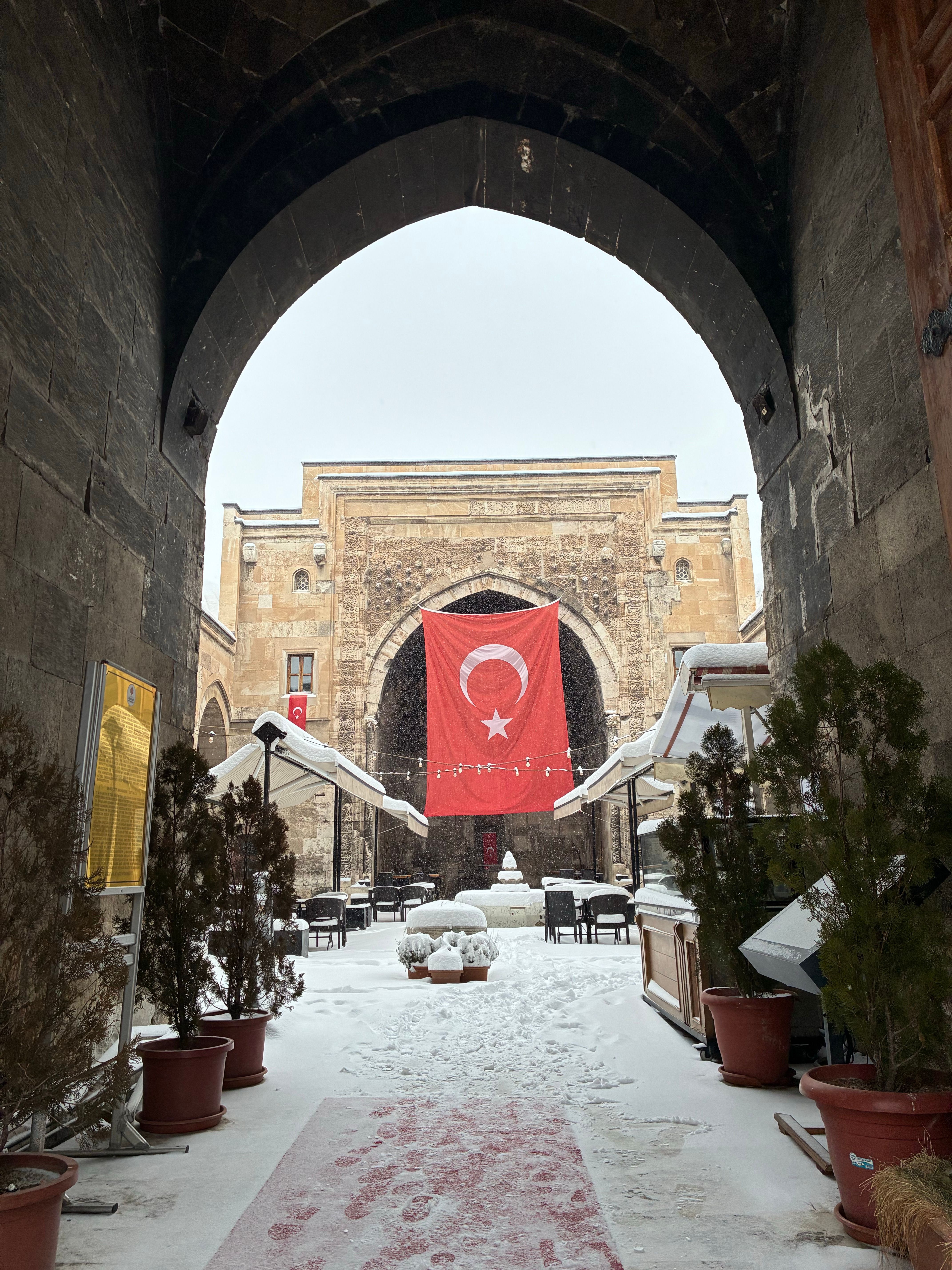 Snowy Courtyard in Sivas with Turkish Flag · Free Stock Photo