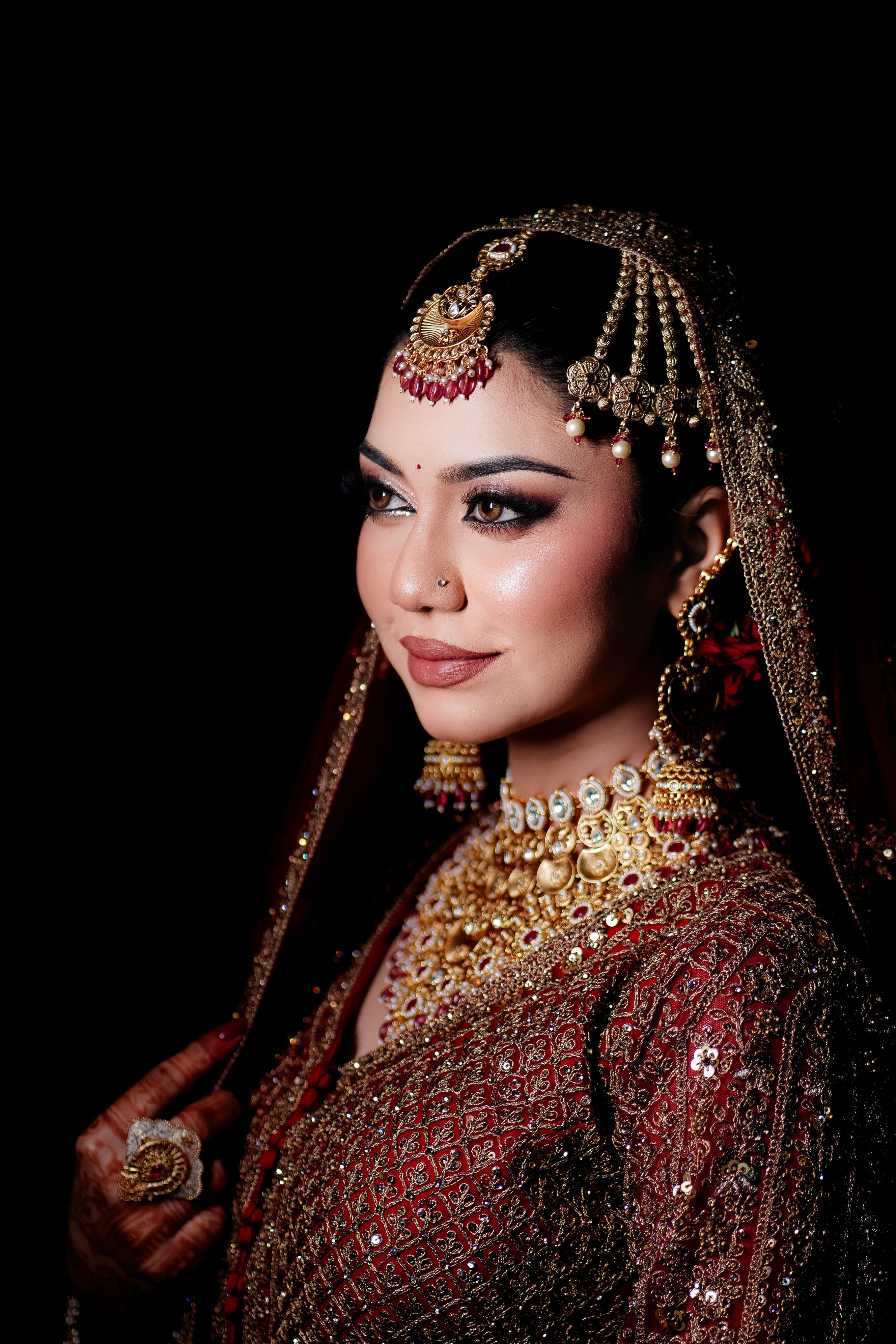 Elegant South Asian Bridal Portrait in Red Attire · Free Stock Photo