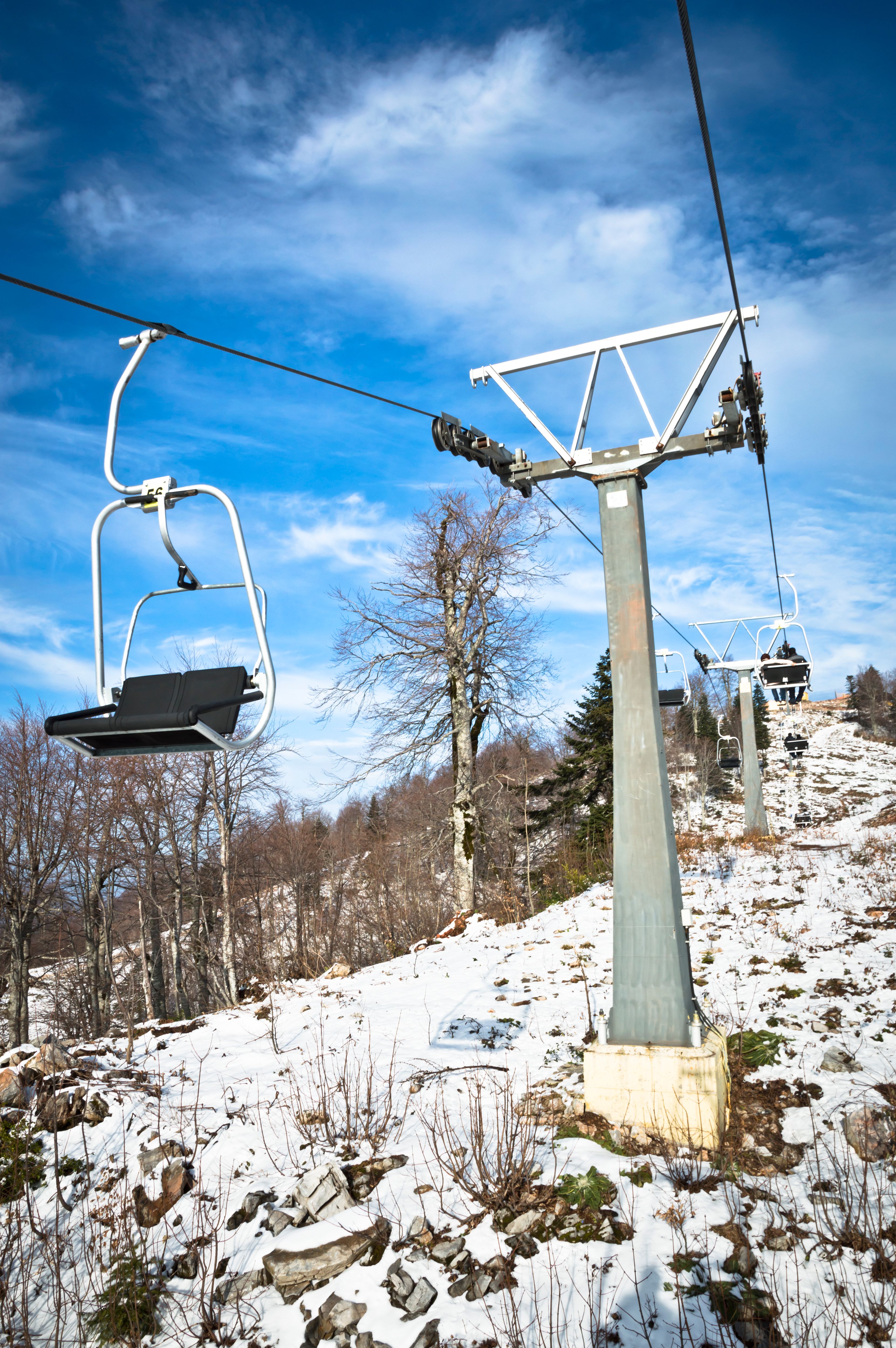 Ski Lift Ascending Snowy Mountain Slope · Free Stock Photo