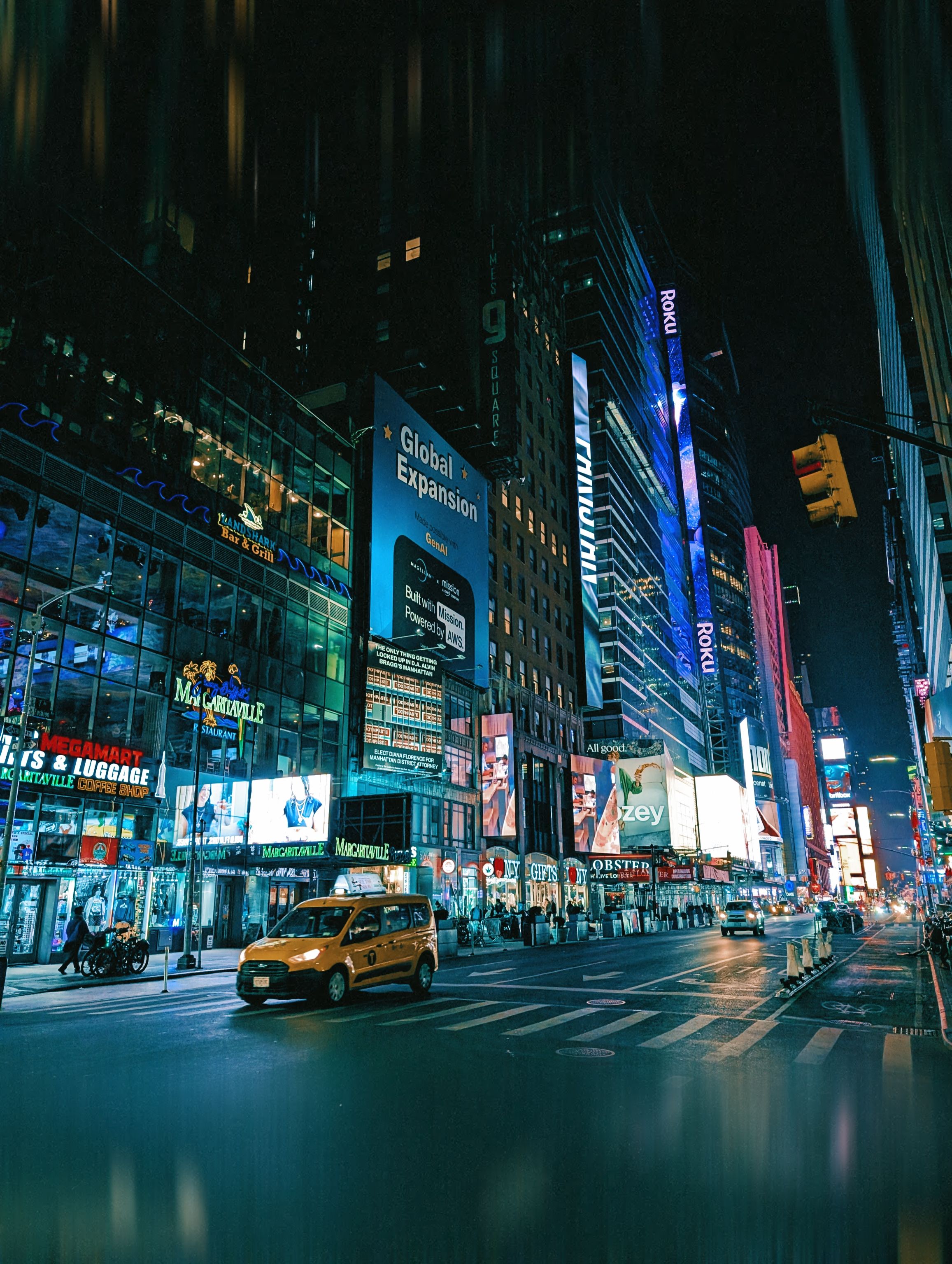 Vibrant Times Square Night Scene with Neon Lights · Free Stock Photo