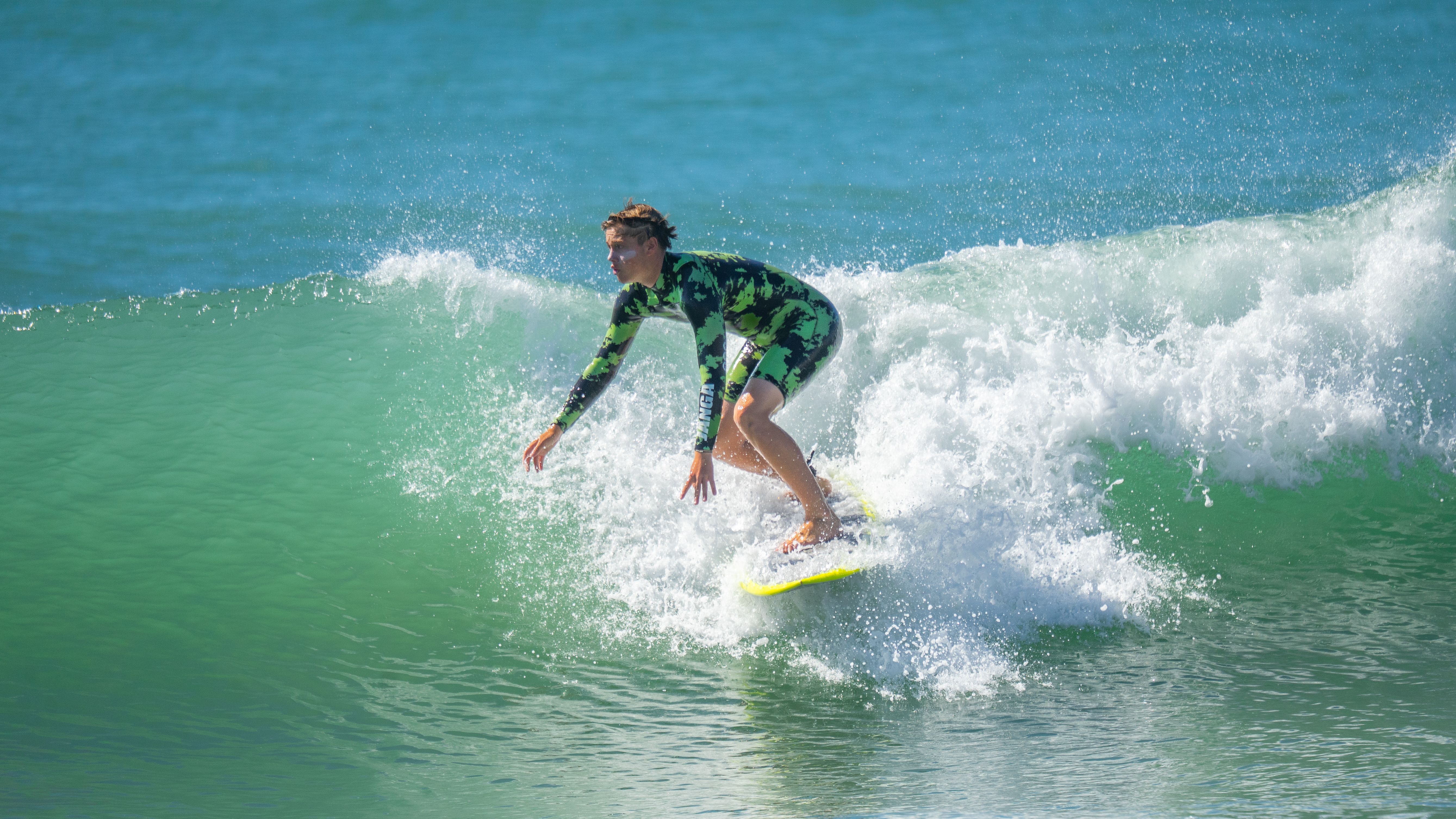 Exciting Surfing Action on Ocean Waves · Free Stock Photo