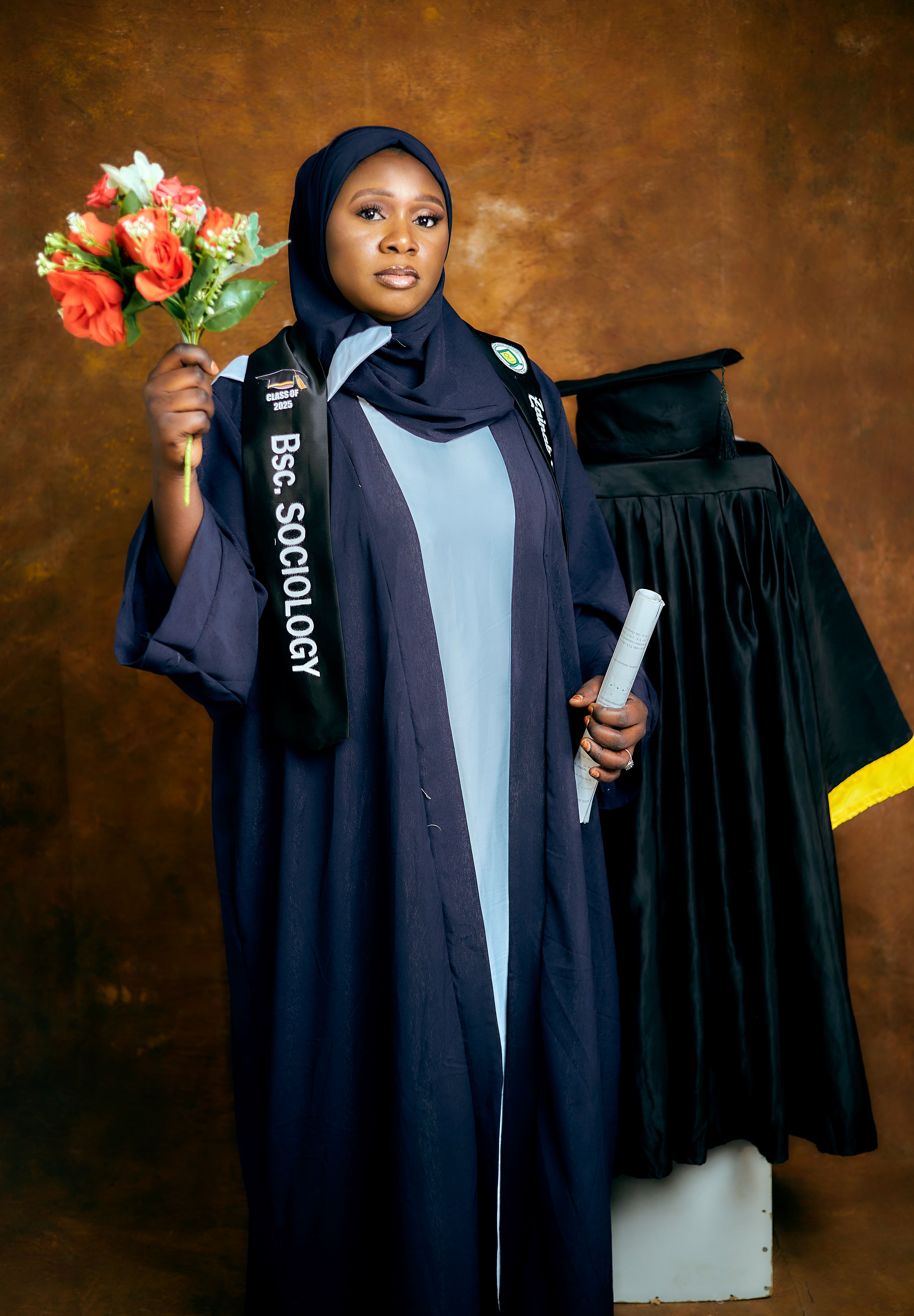 Graduation Portrait with Hijab and Flowers · Free Stock Photo