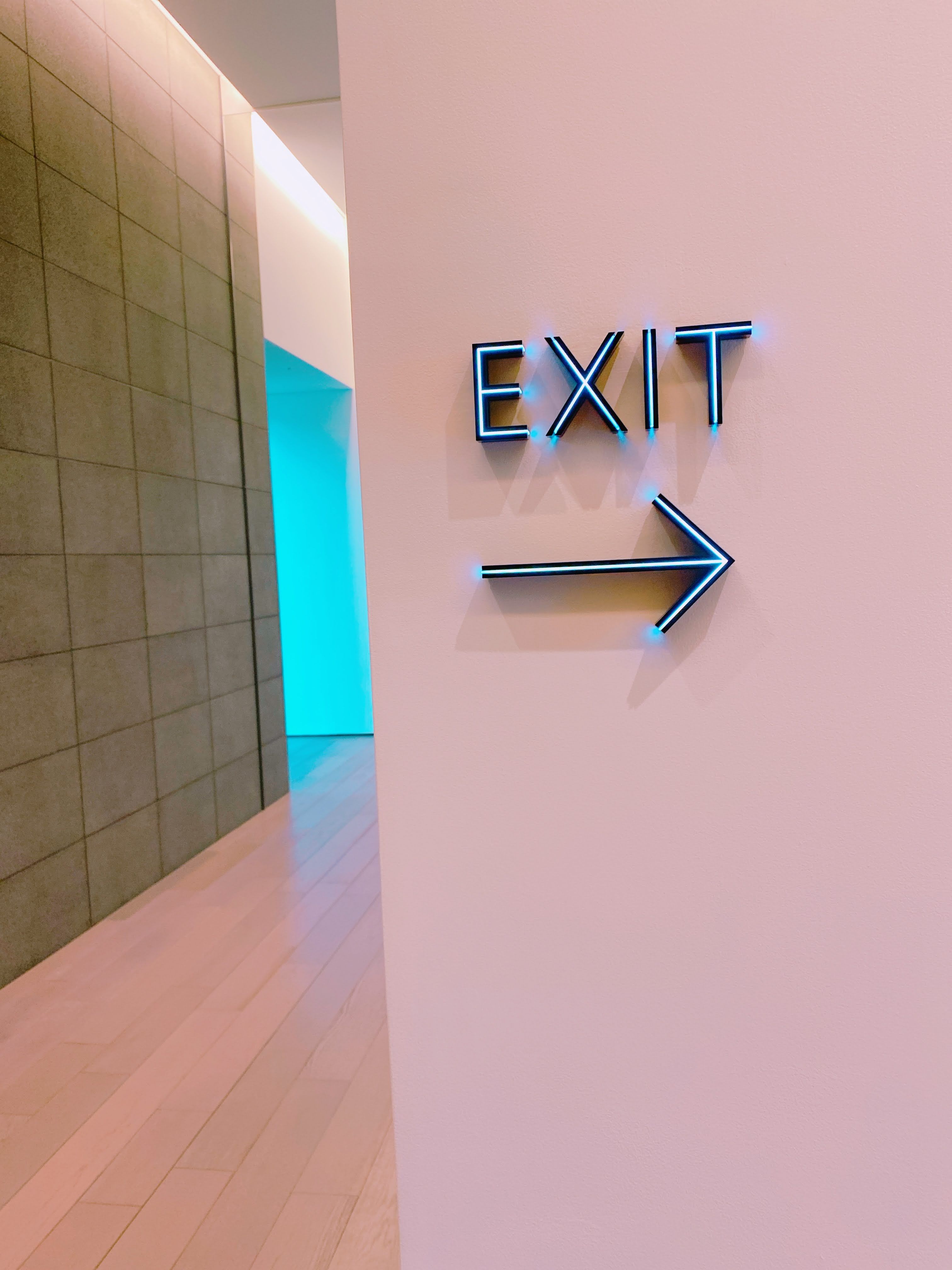 Modern Exit Sign with Neon Lighting · Free Stock Photo