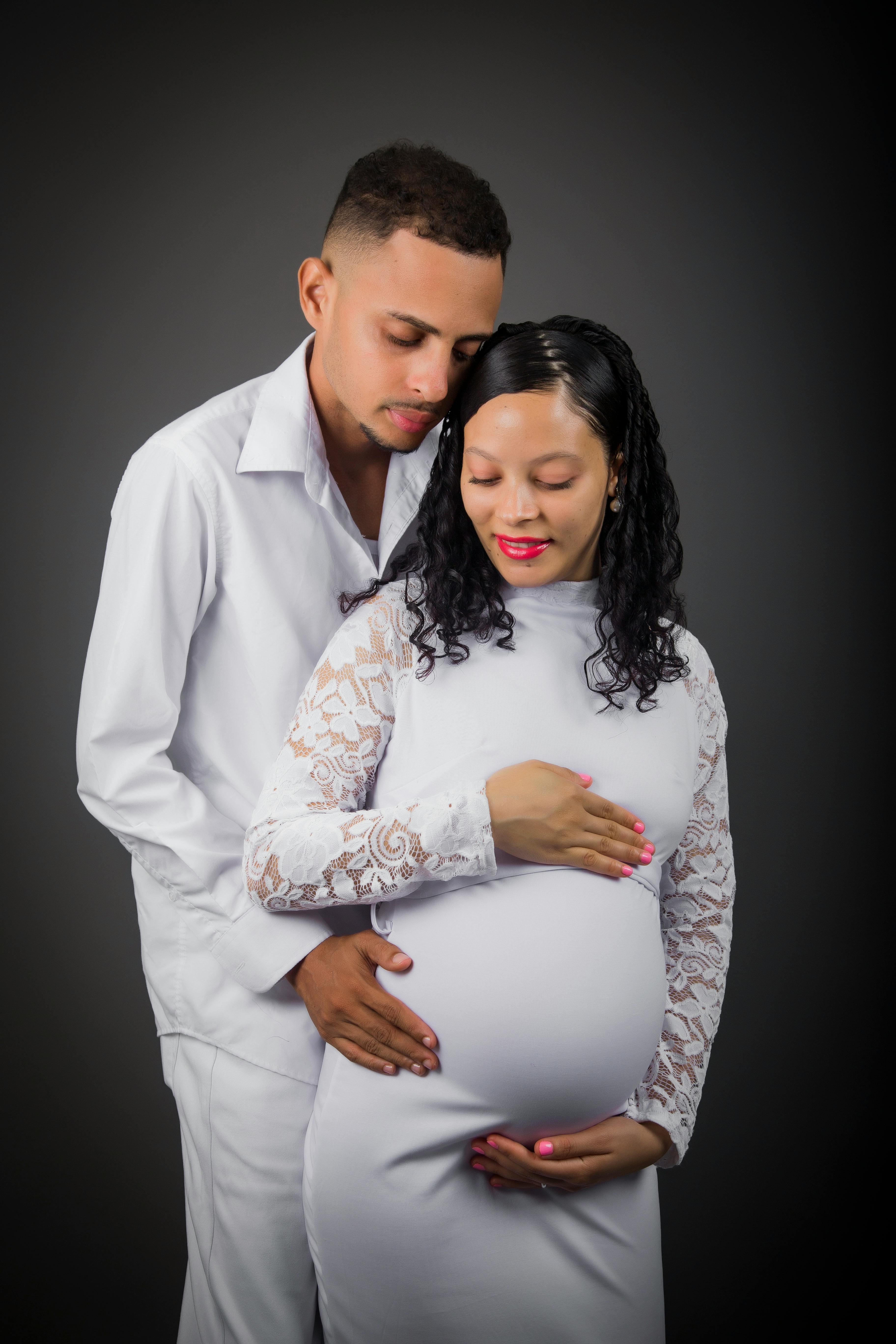 Romantic Maternity Portrait in White Outfits · Free Stock Photo