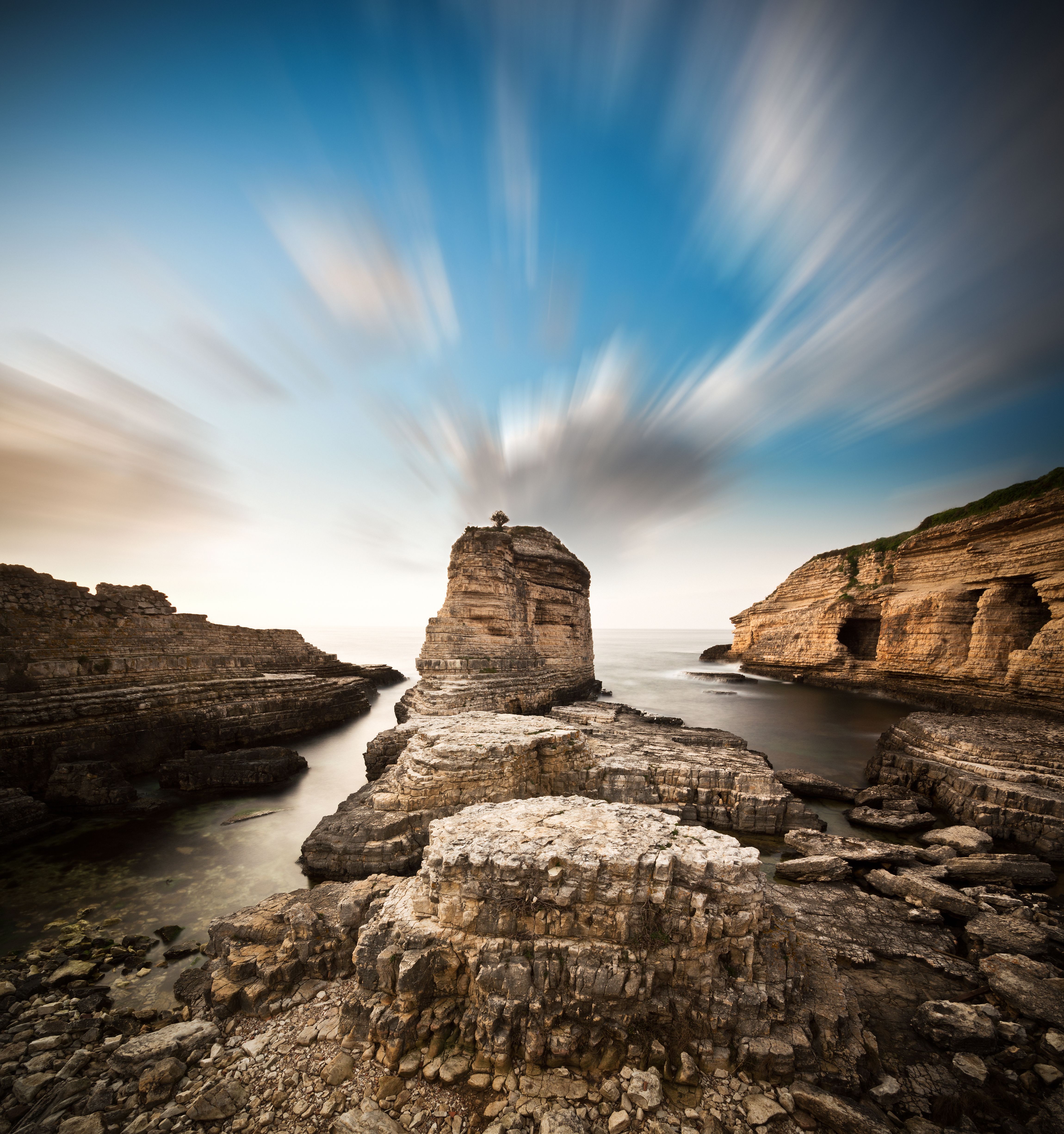 Dramatic Coastal Rock Formation at Sunrise · Free Stock Photo