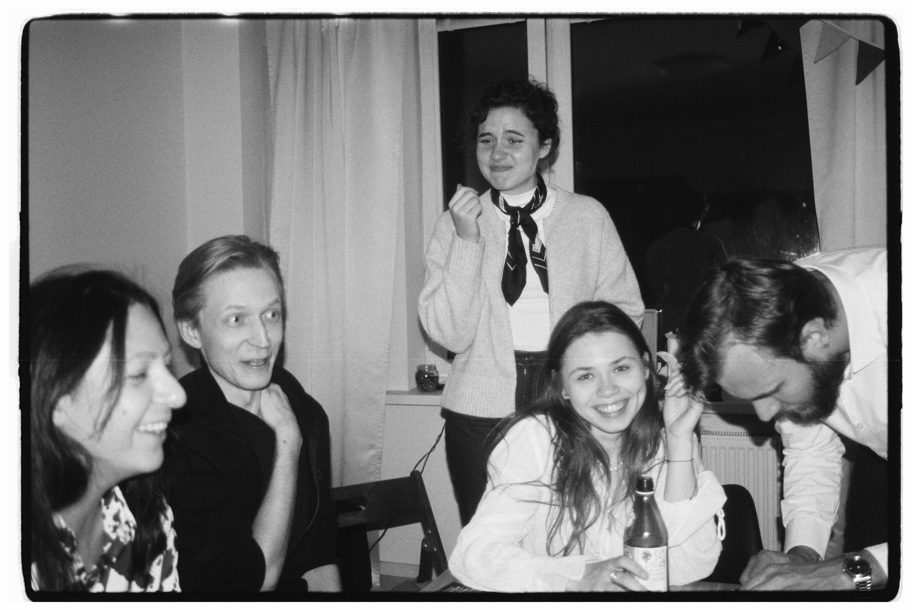 Casual indoor gathering of friends enjoying a party · Free Stock Photo