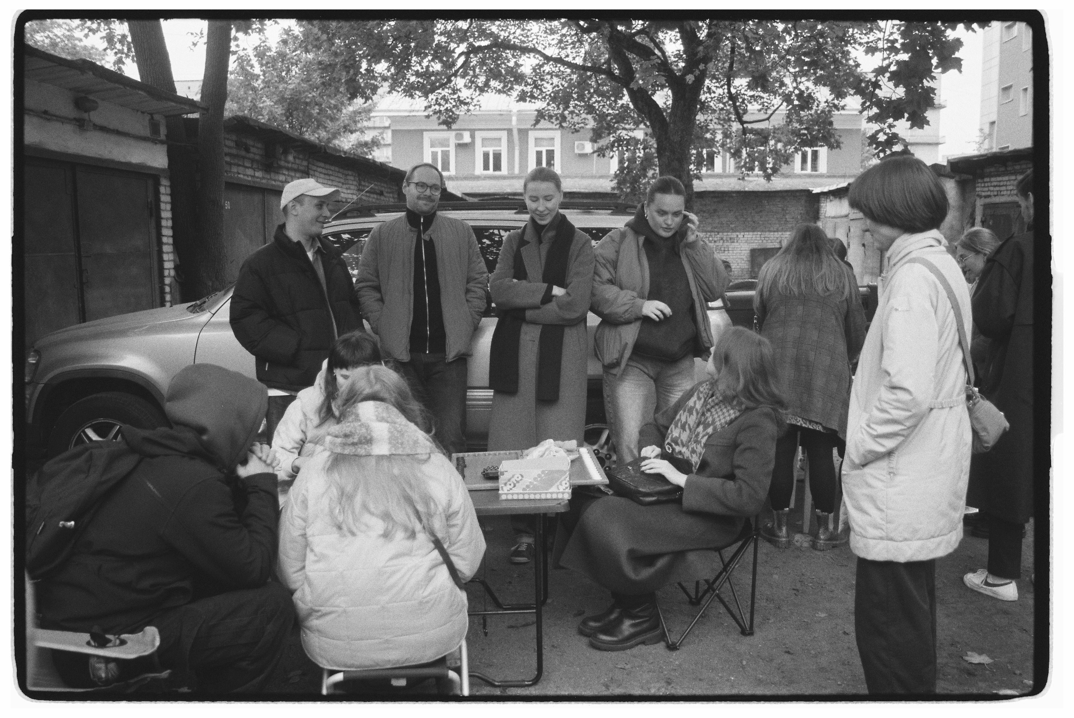 Black and White Urban Street Gathering Scene · Free Stock Photo