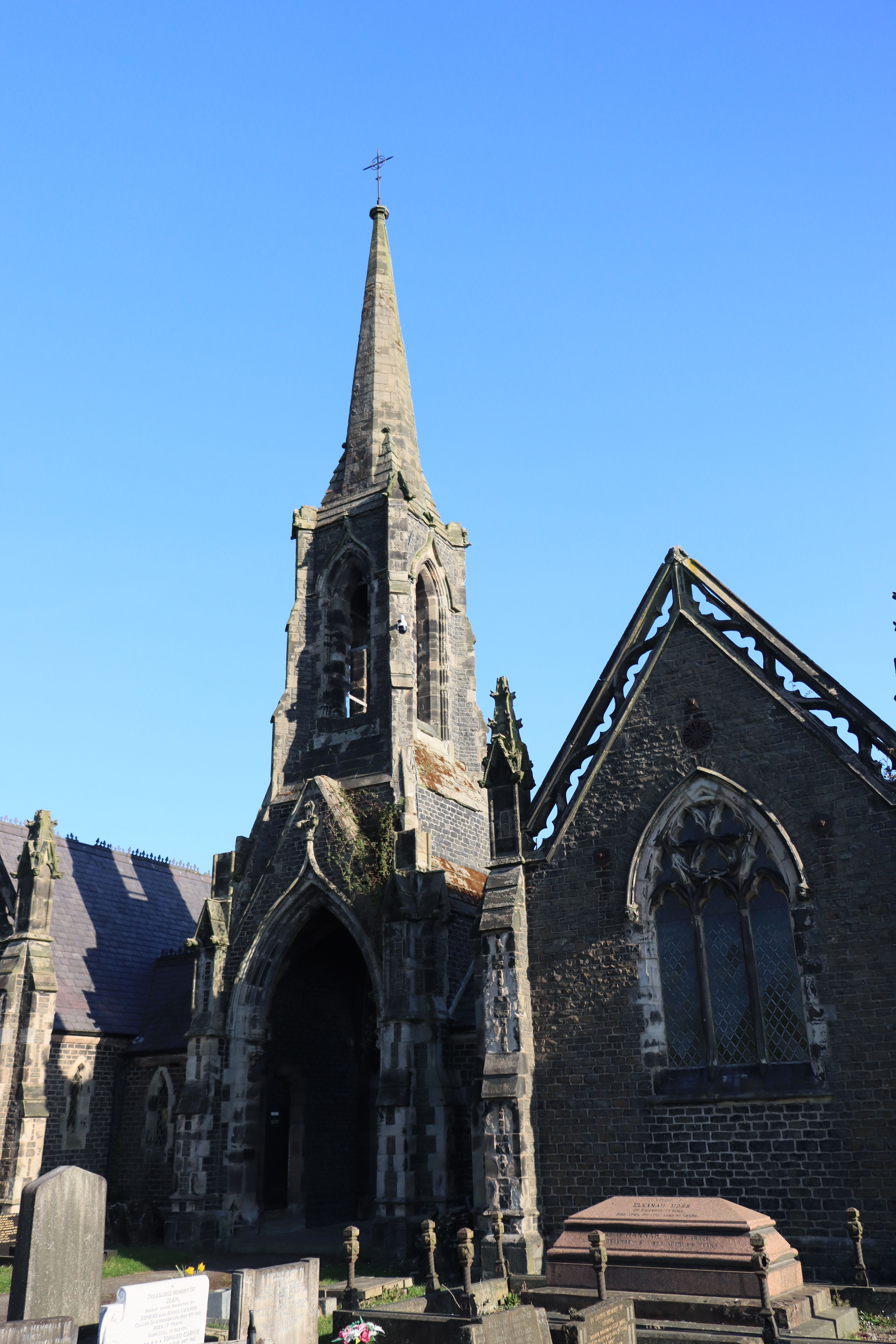 Historic Gothic Church with Tower Against Blue Sky · Free Stock Photo