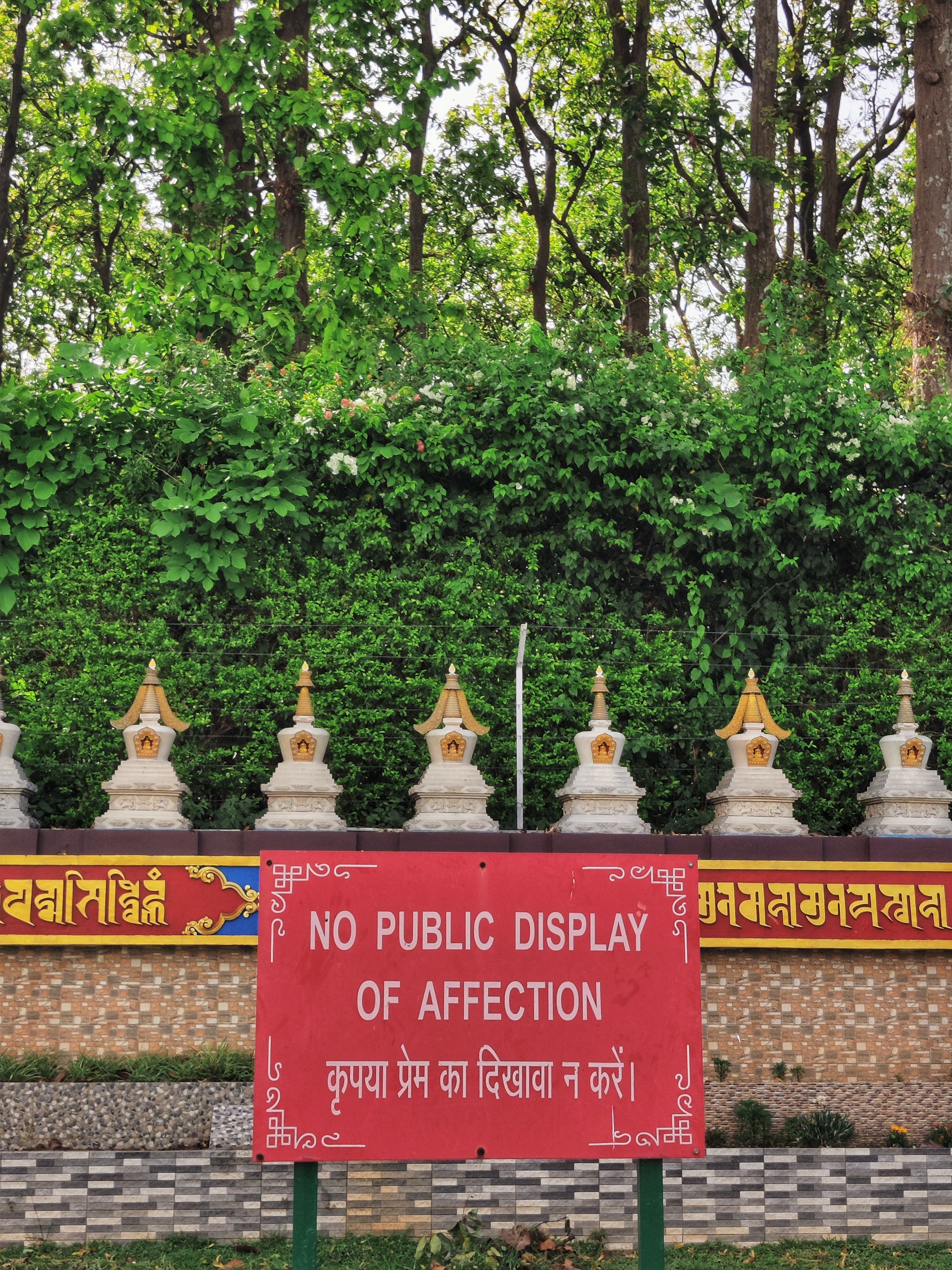 Buddhist Stupa Wall with No Affection Sign · Free Stock Photo