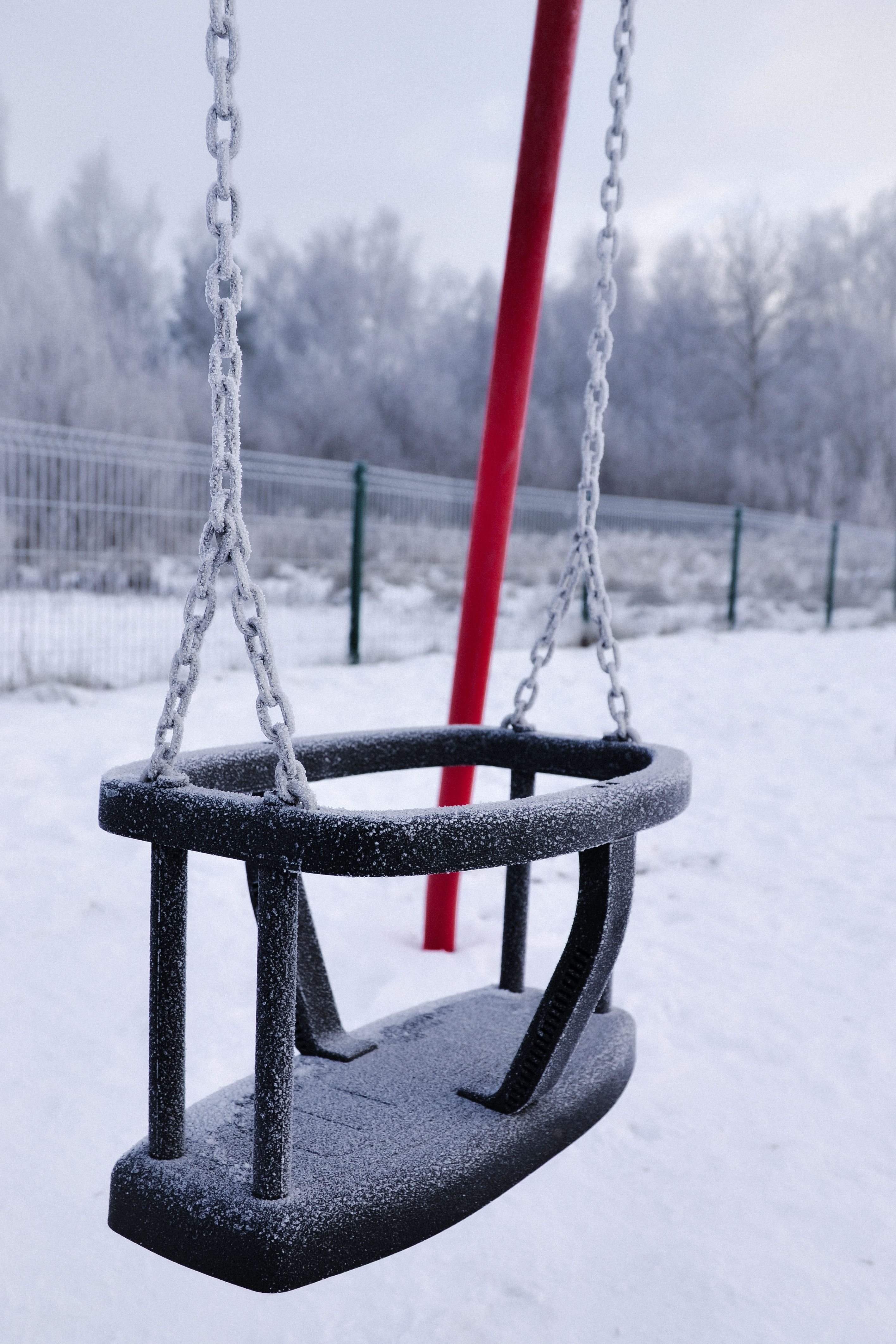Frosty Winter Swing in Snowy Playground · Free Stock Photo