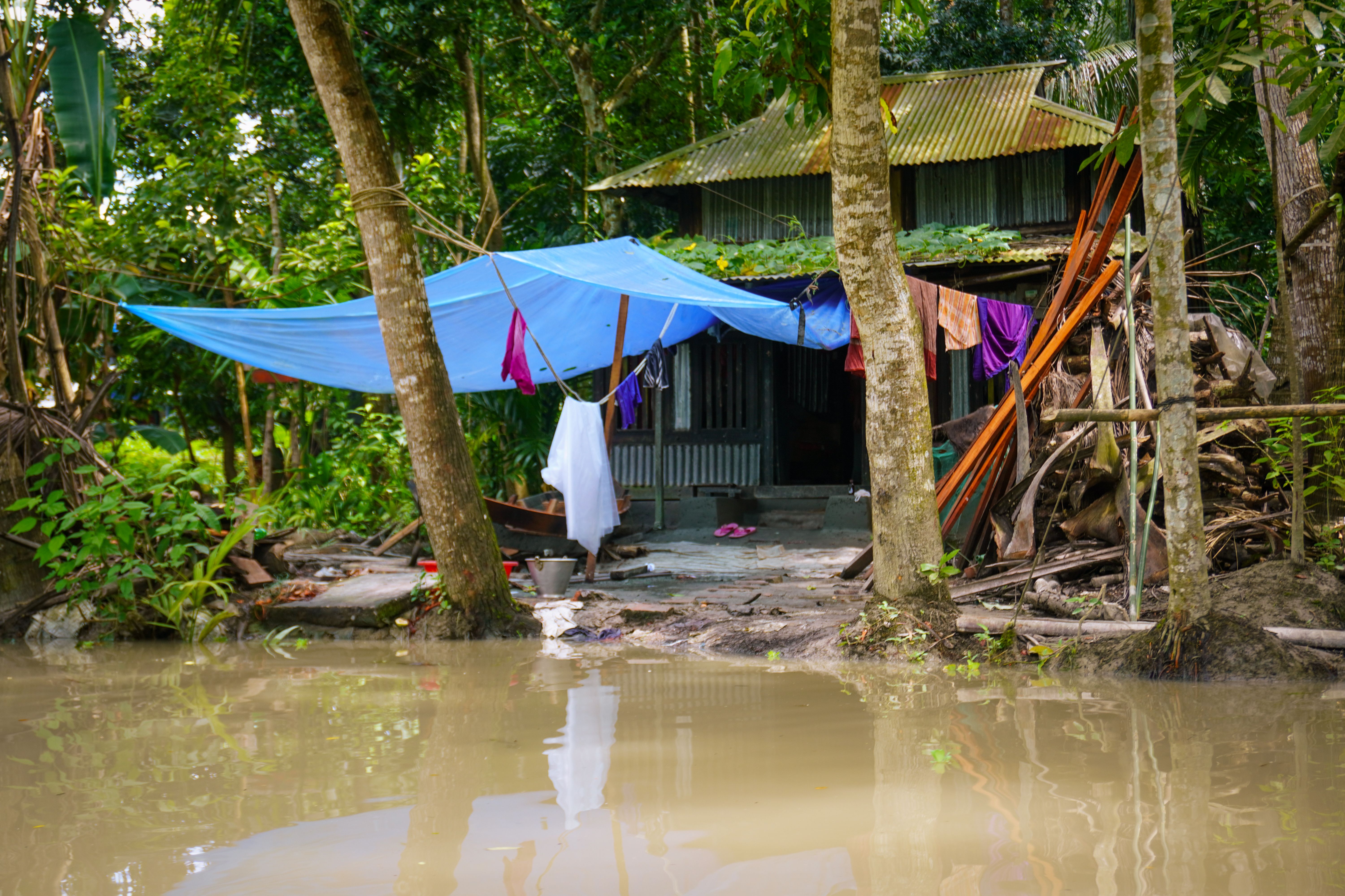 Rural Flooded Area with Makeshift Shelter · Free Stock Photo