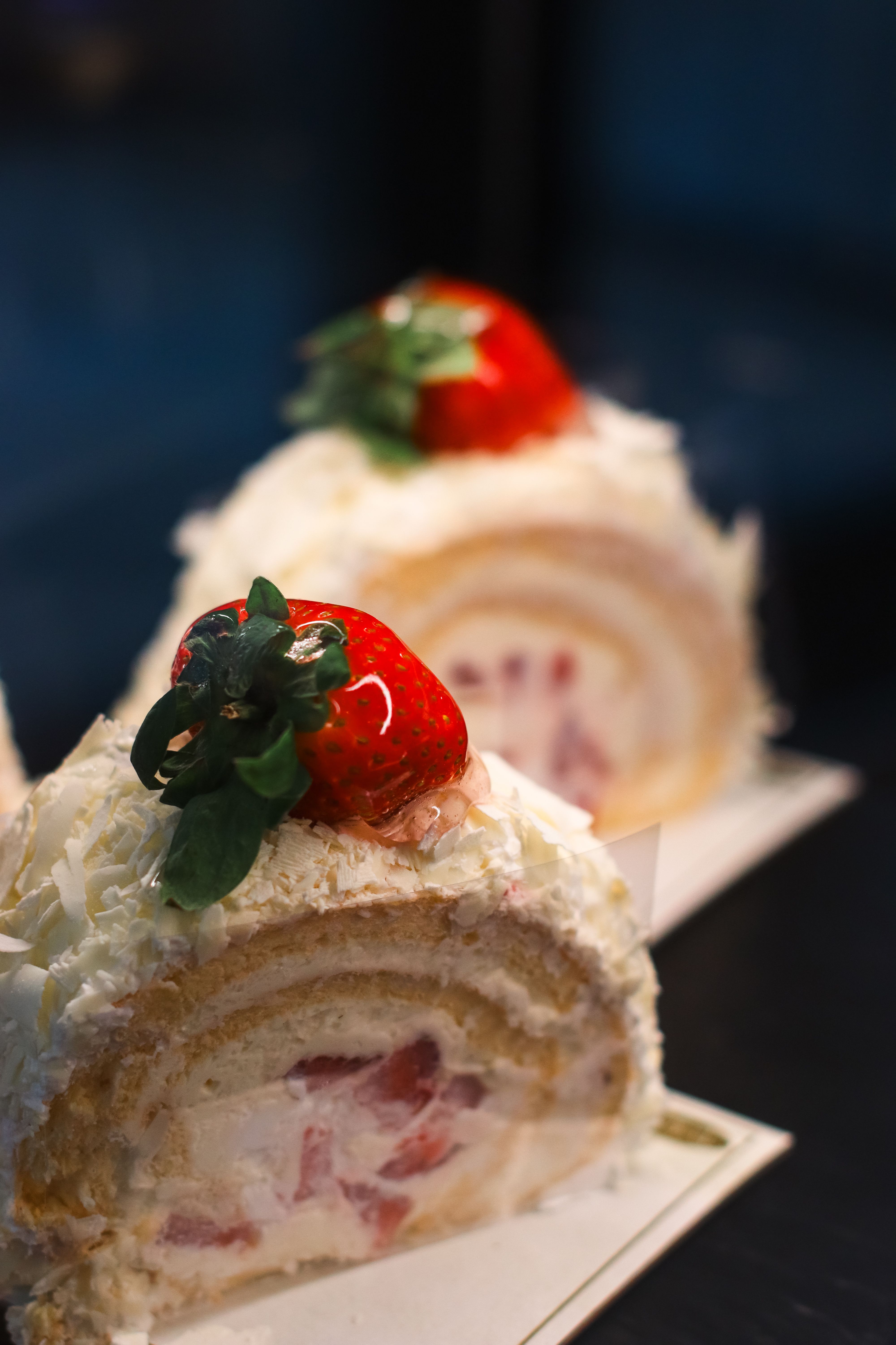 Delicious Strawberry Swiss Roll Dessert Close-up · Free Stock Photo
