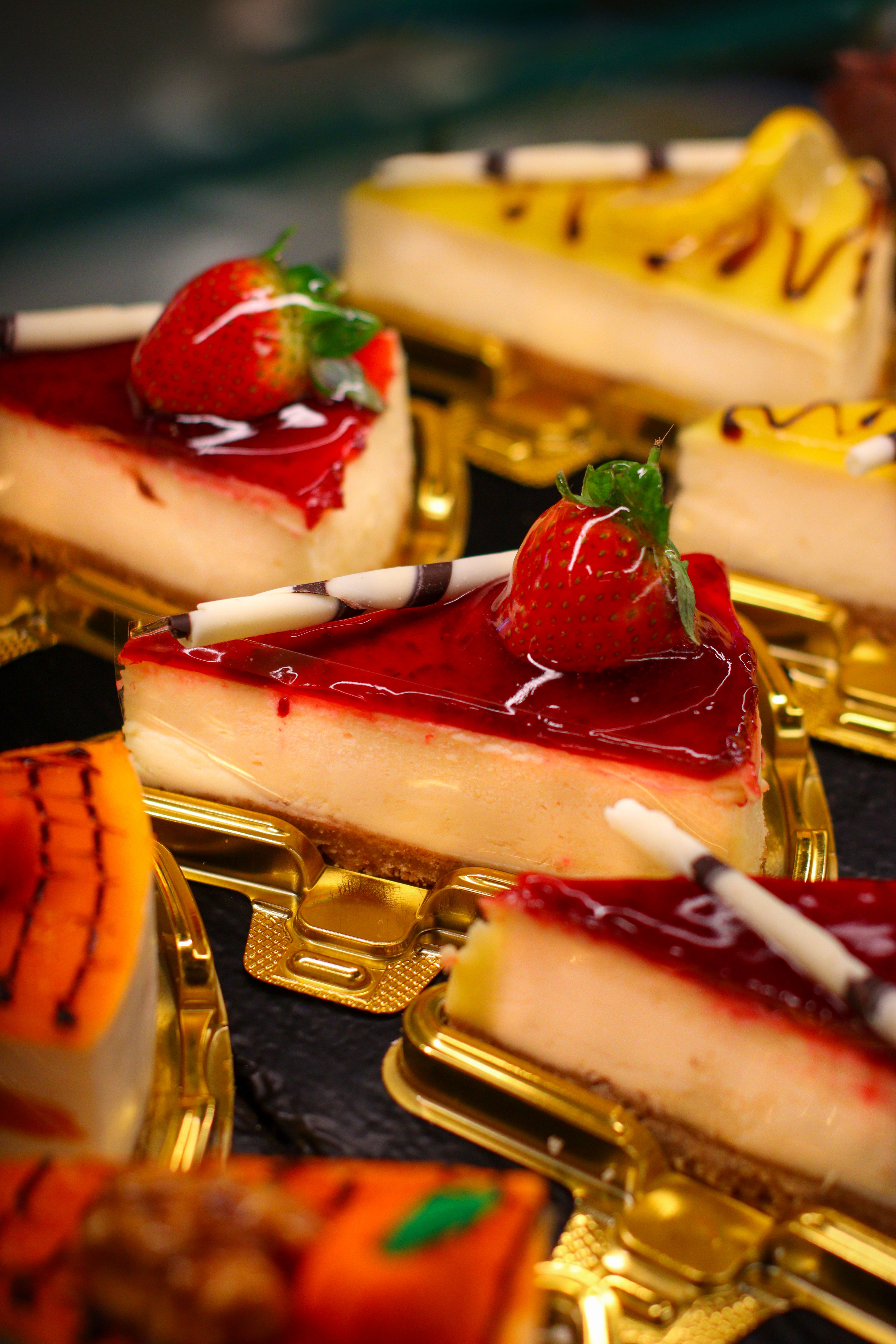 Delicious Strawberry Topped Cheesecake Slices · Free Stock Photo