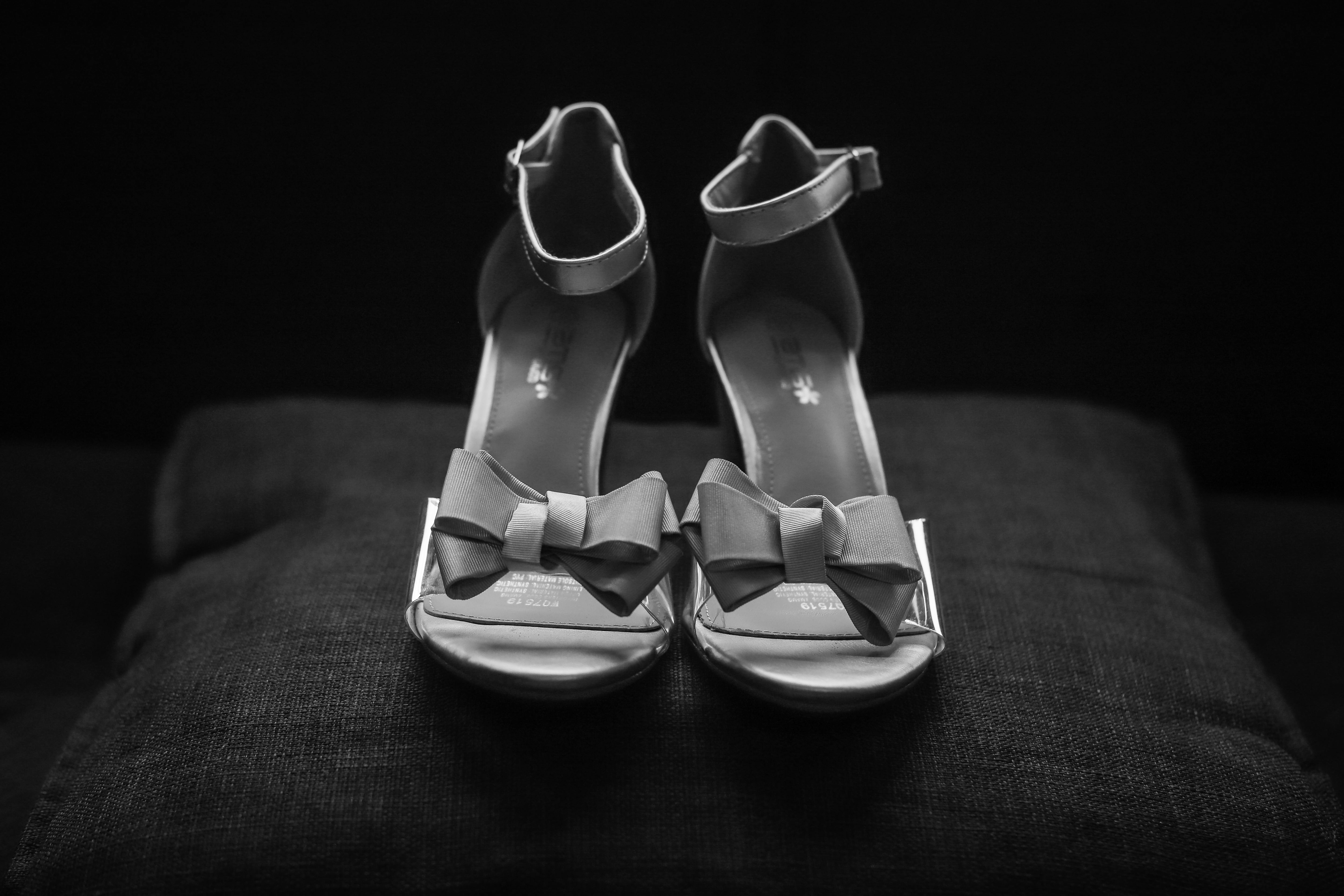 Grayscale Photography of Pair of Open-toe Ankle-strap Bow Accent ...