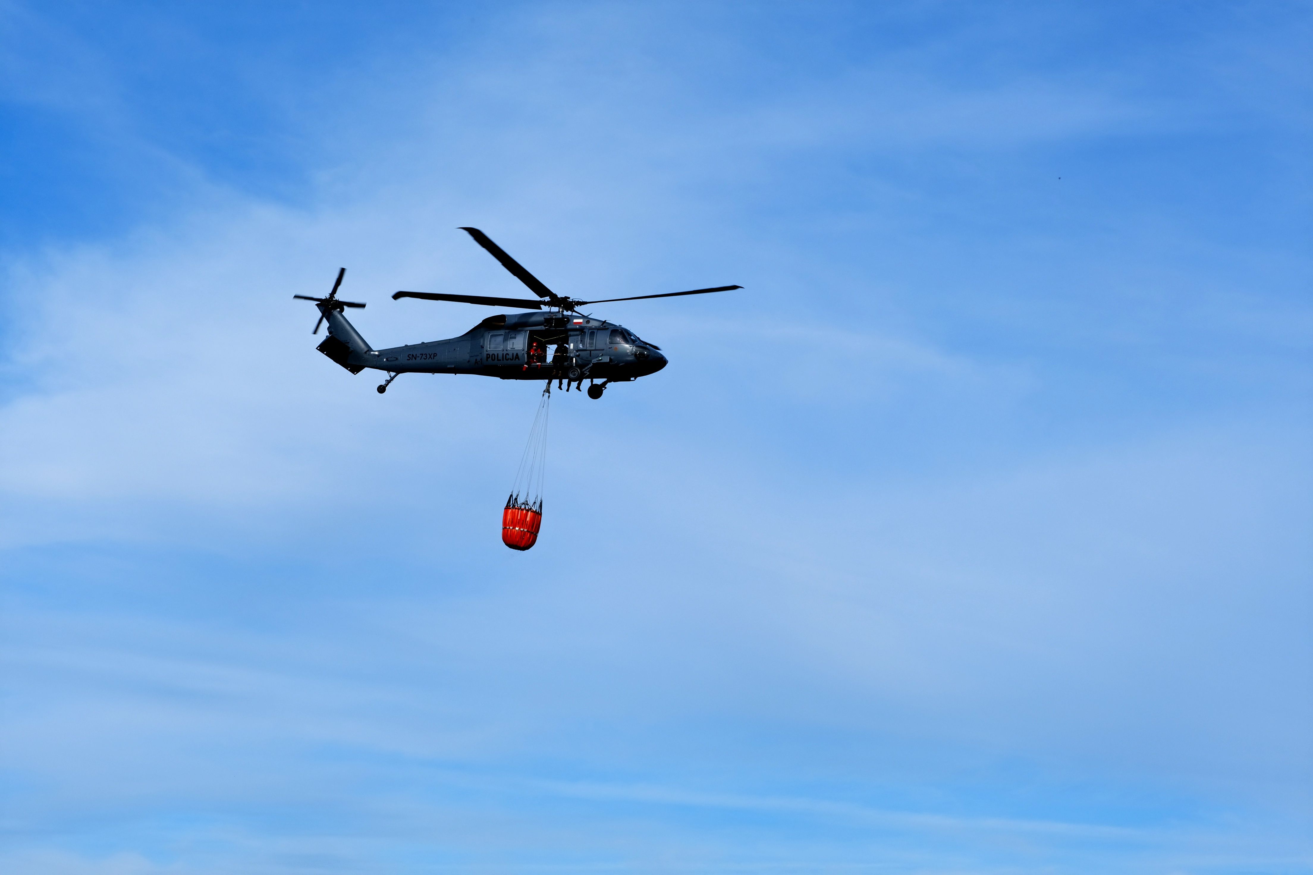 Helicopter Carrying Water for Firefighting · Free Stock Photo