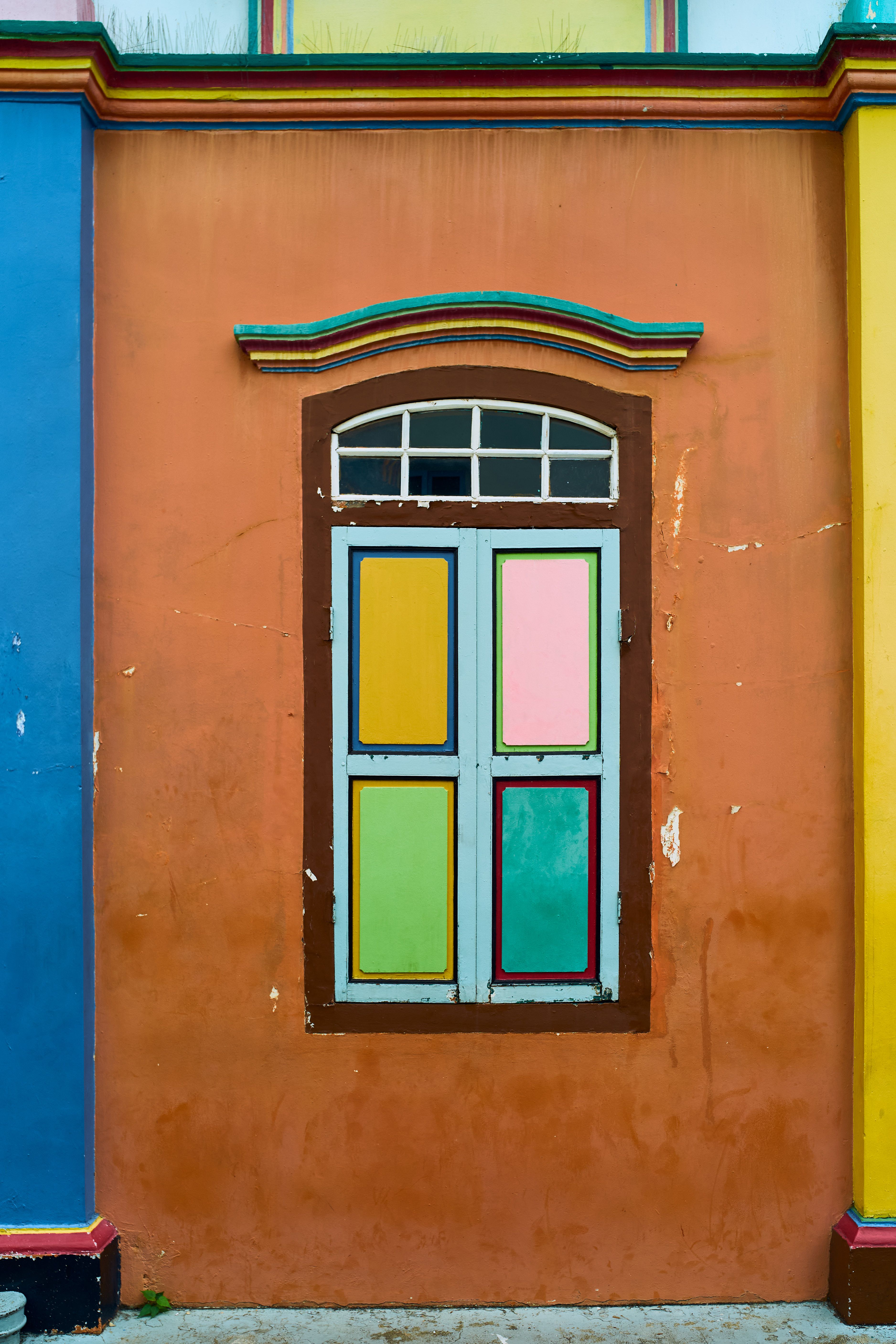 Vibrant Traditional Shophouse Window in Singapore · Free Stock Photo